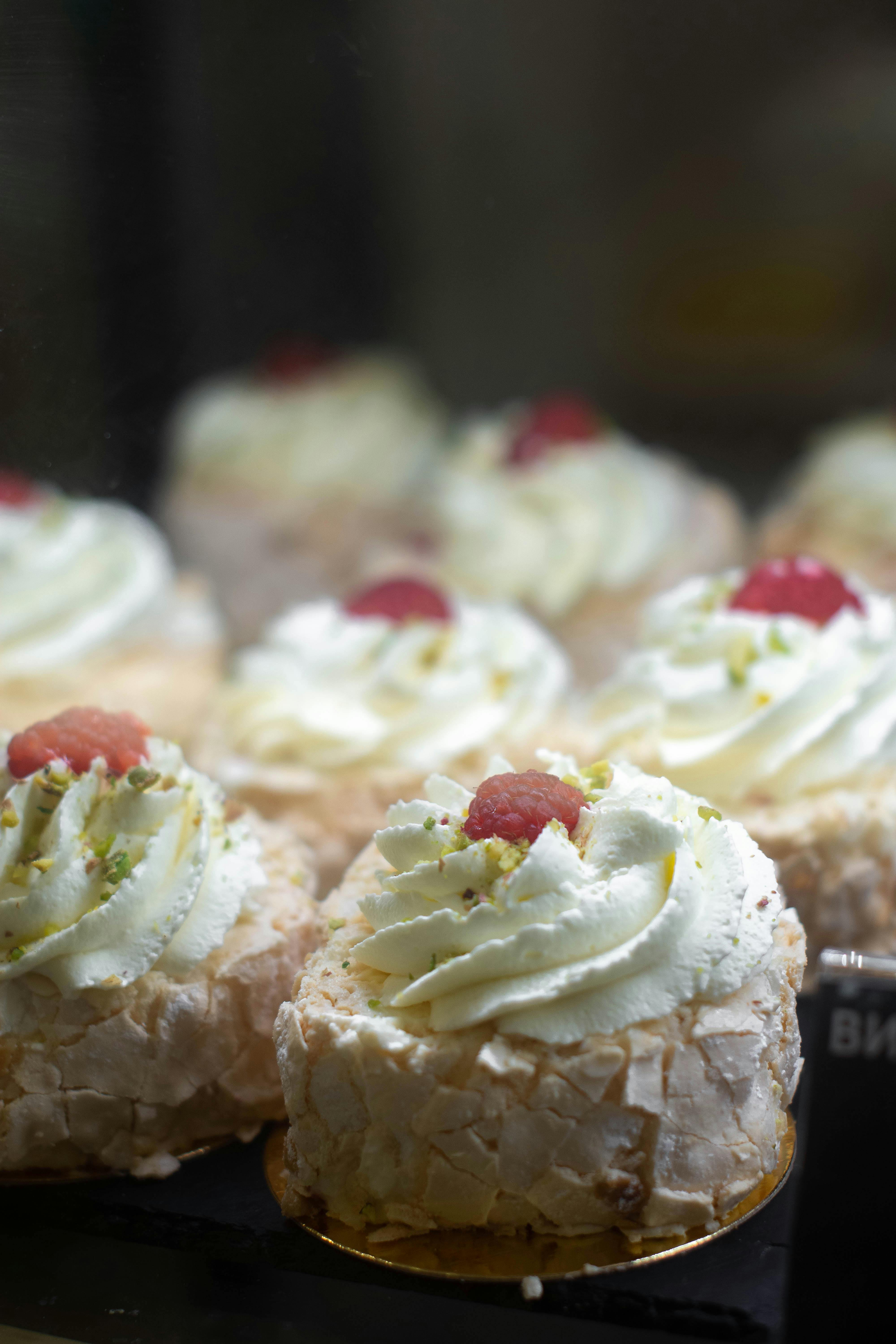 Mini Pavlova with Raspberry and Crushed Pistachios · Free Stock Photo