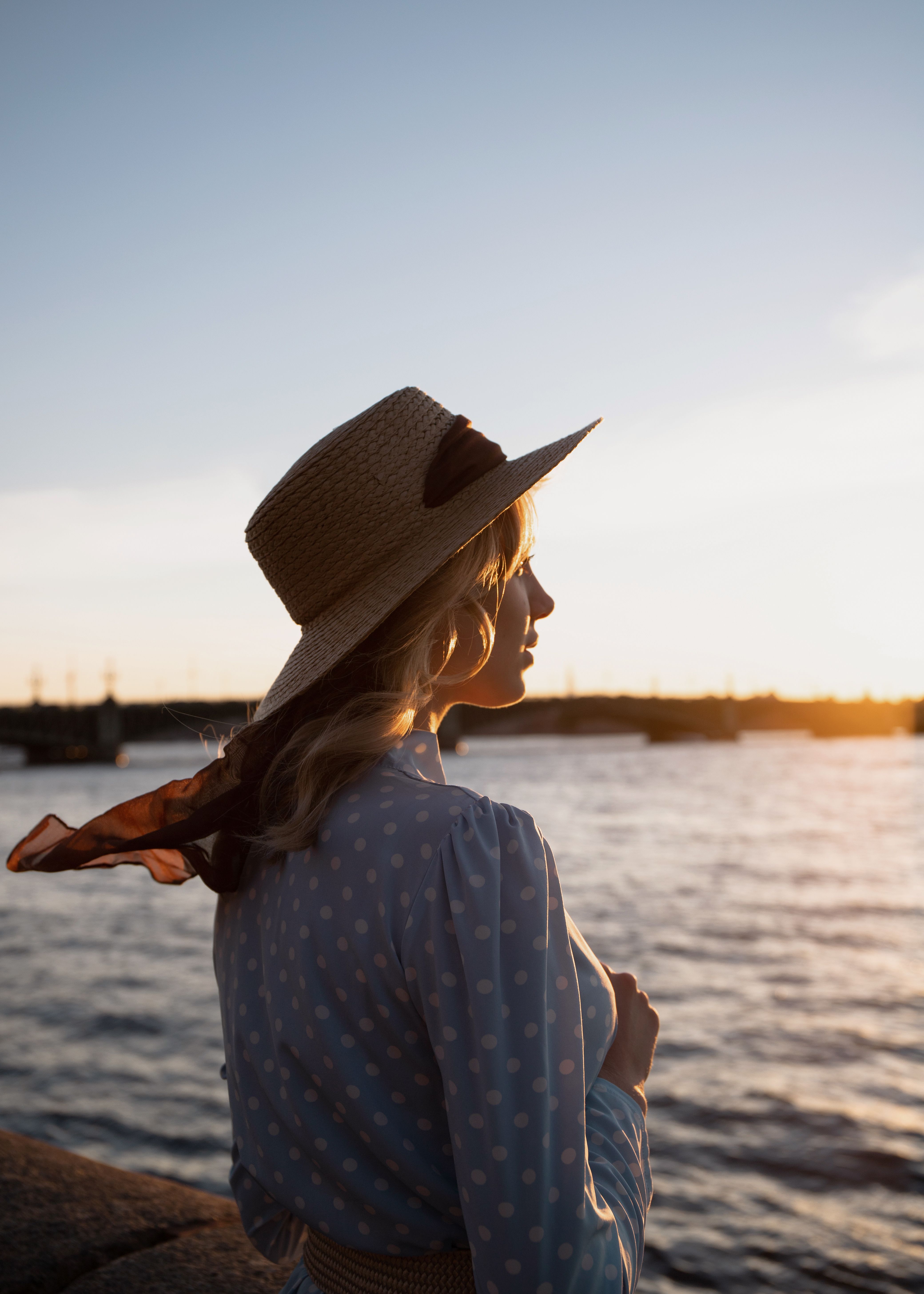 Close-Up Shot of a Woman Wearing a Sun Hat · Free Stock Photo