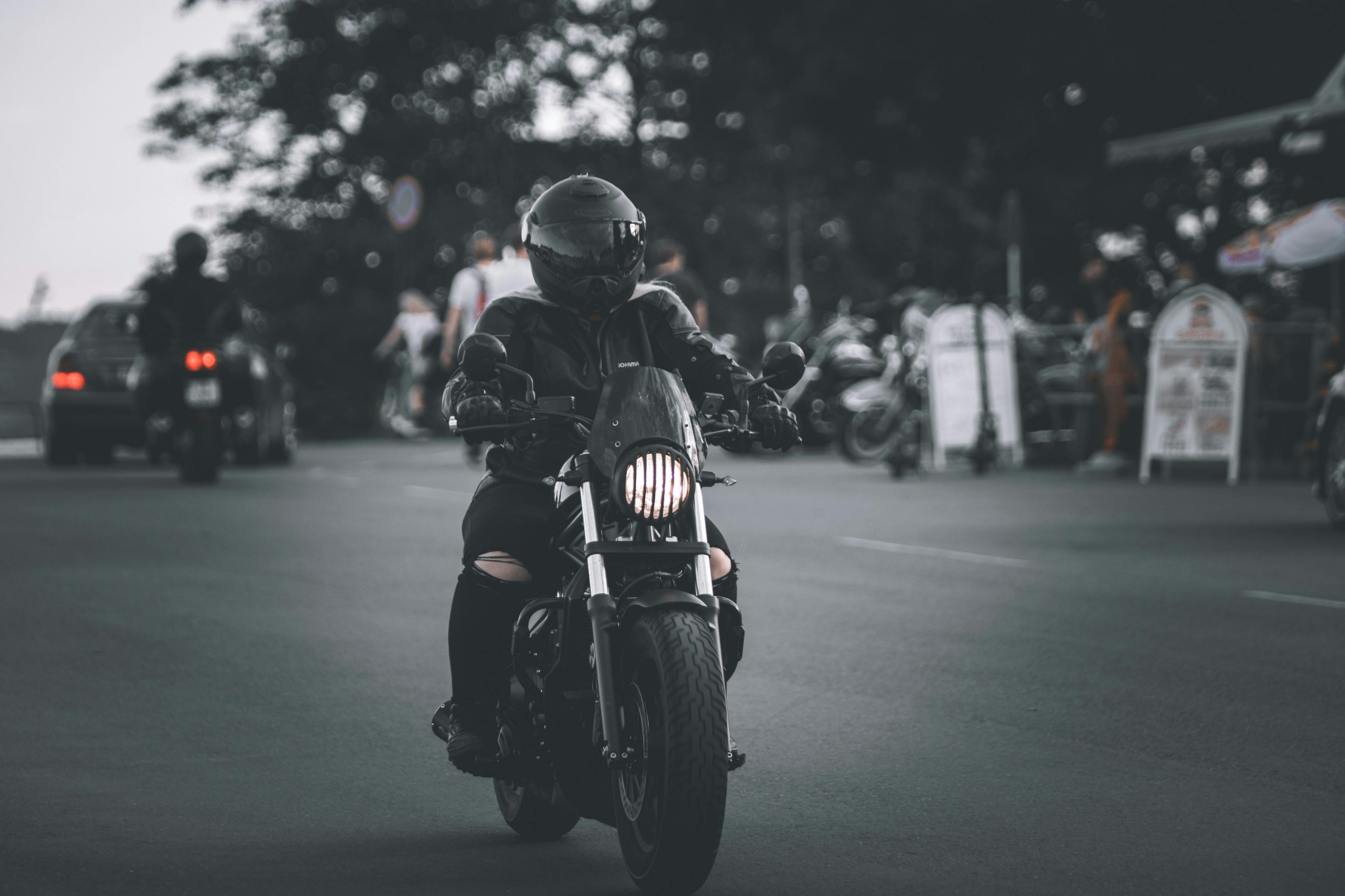 A Person Riding a Motorcycle · Free Stock Photo