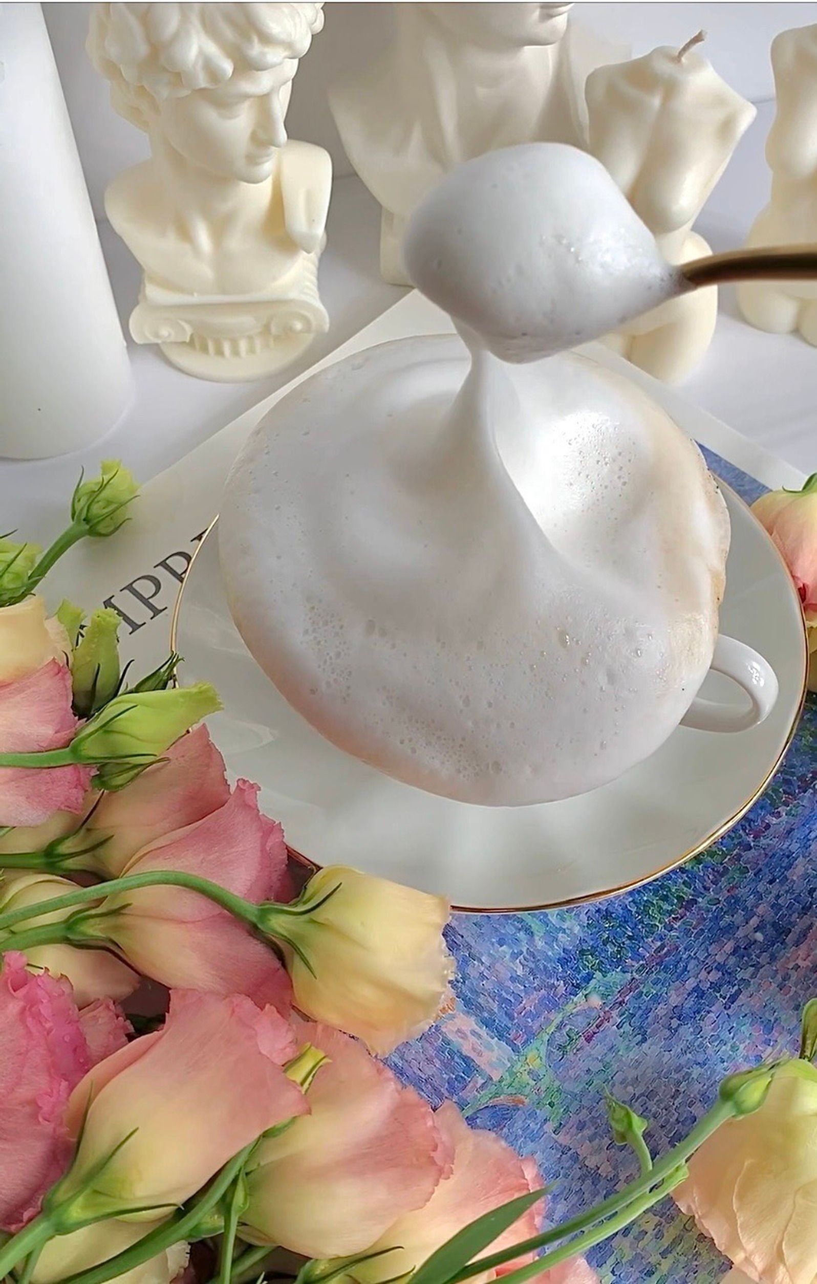 Cream on Spoon over Cappuccino Cup · Free Stock Photo