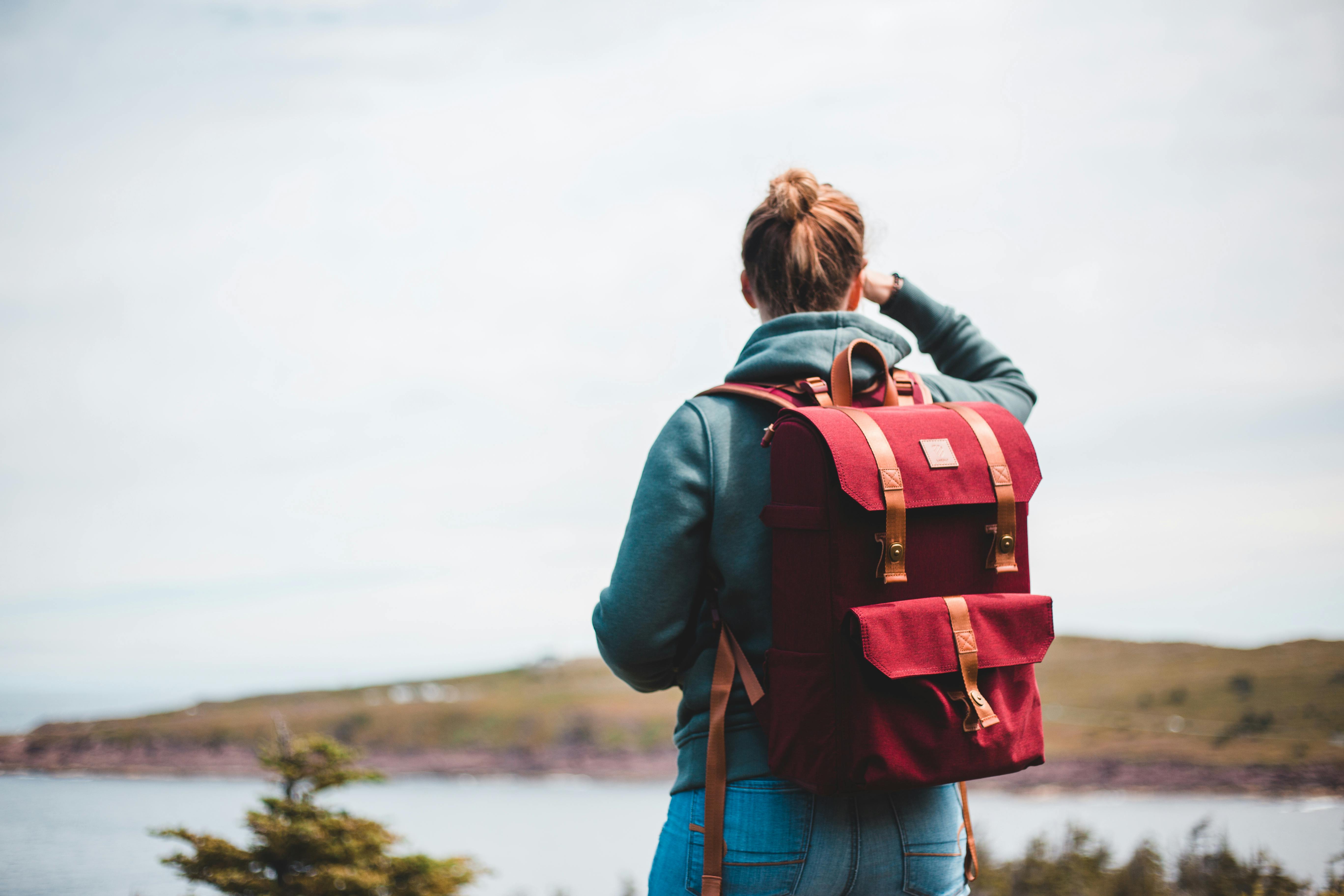 A Woman with a Backpack · Free Stock Photo