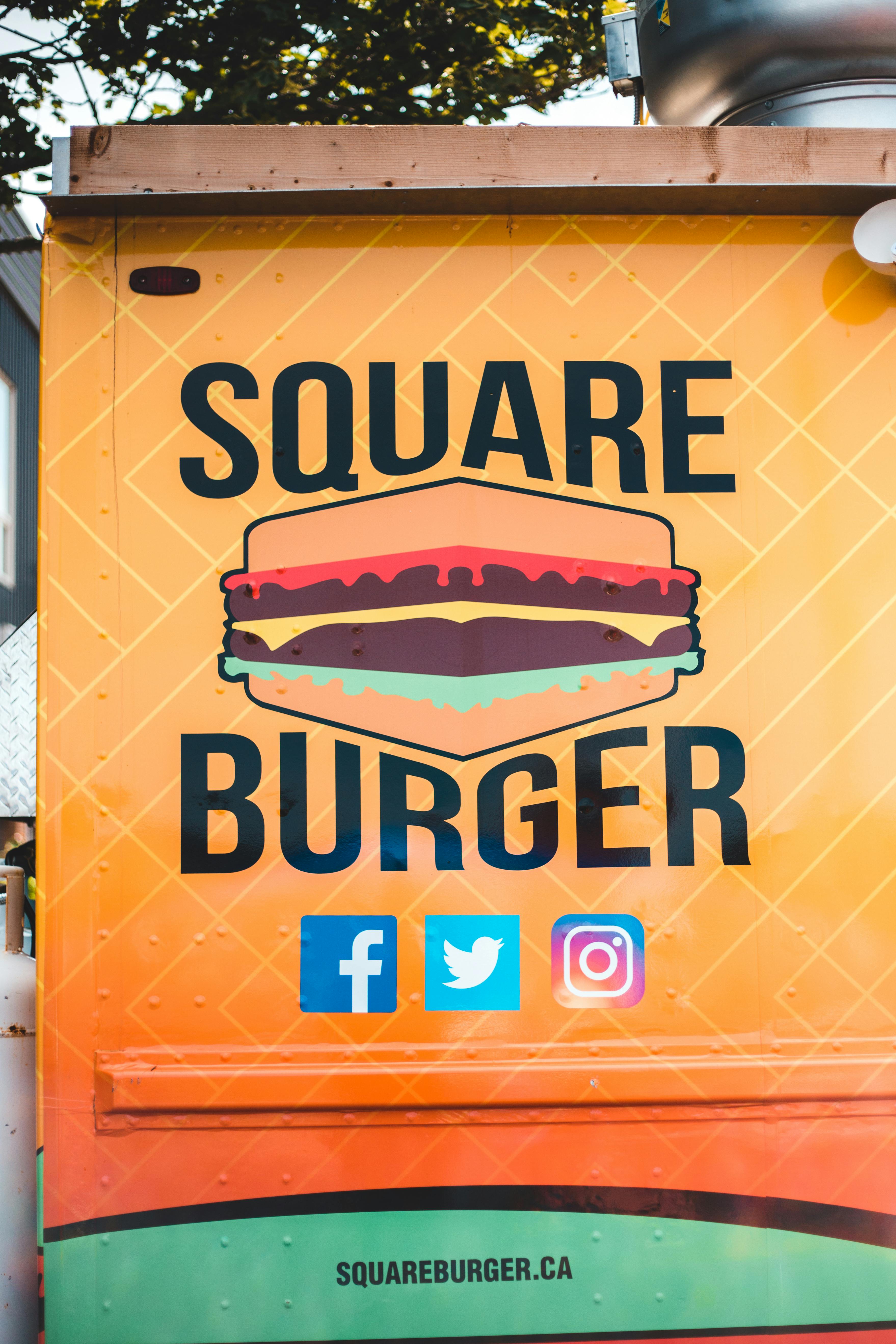 Burger Restaurant Advertising on Wall · Free Stock Photo