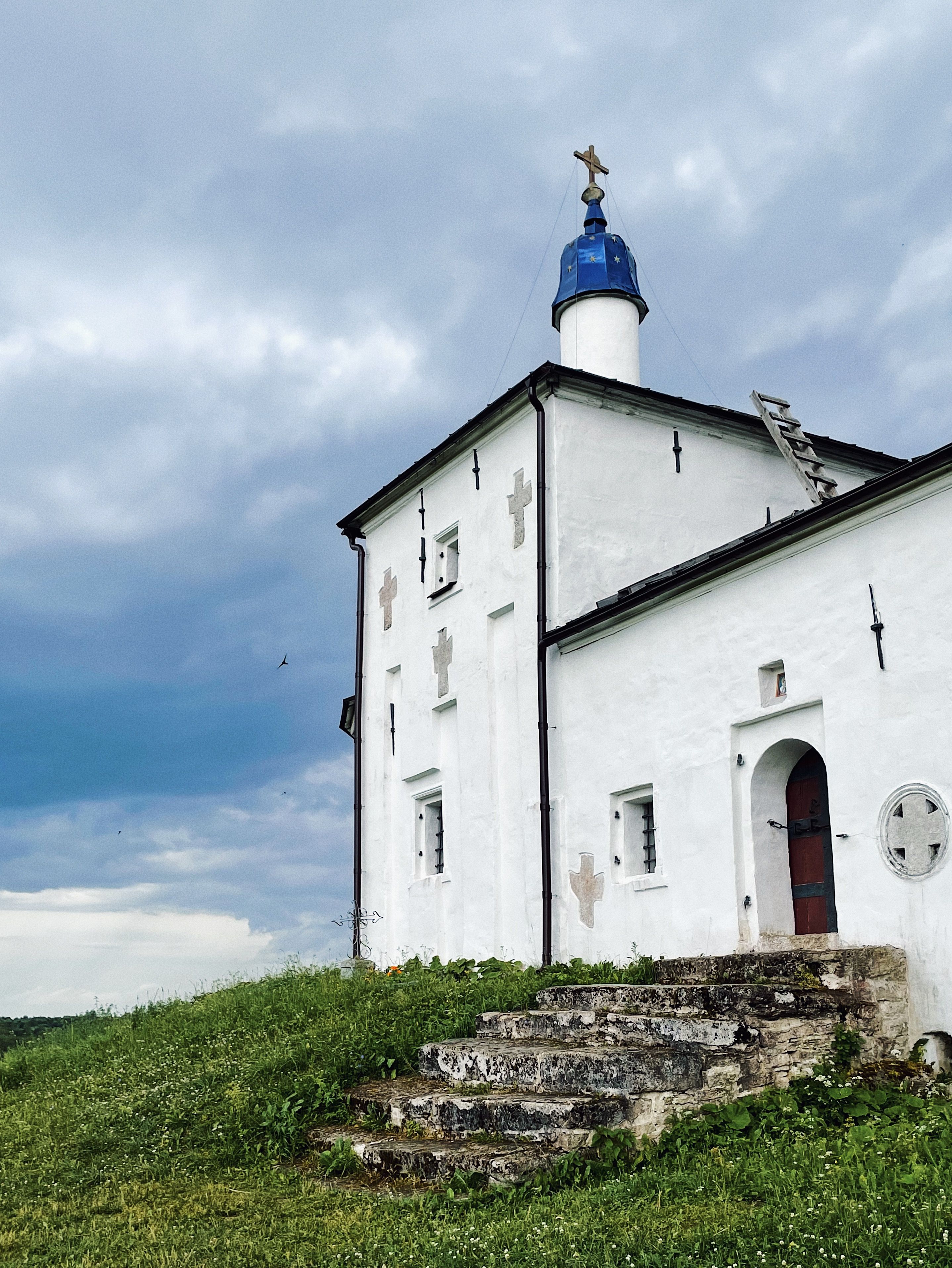 Low-Angle Shot of a Church Under Blue Sky · Free Stock Photo