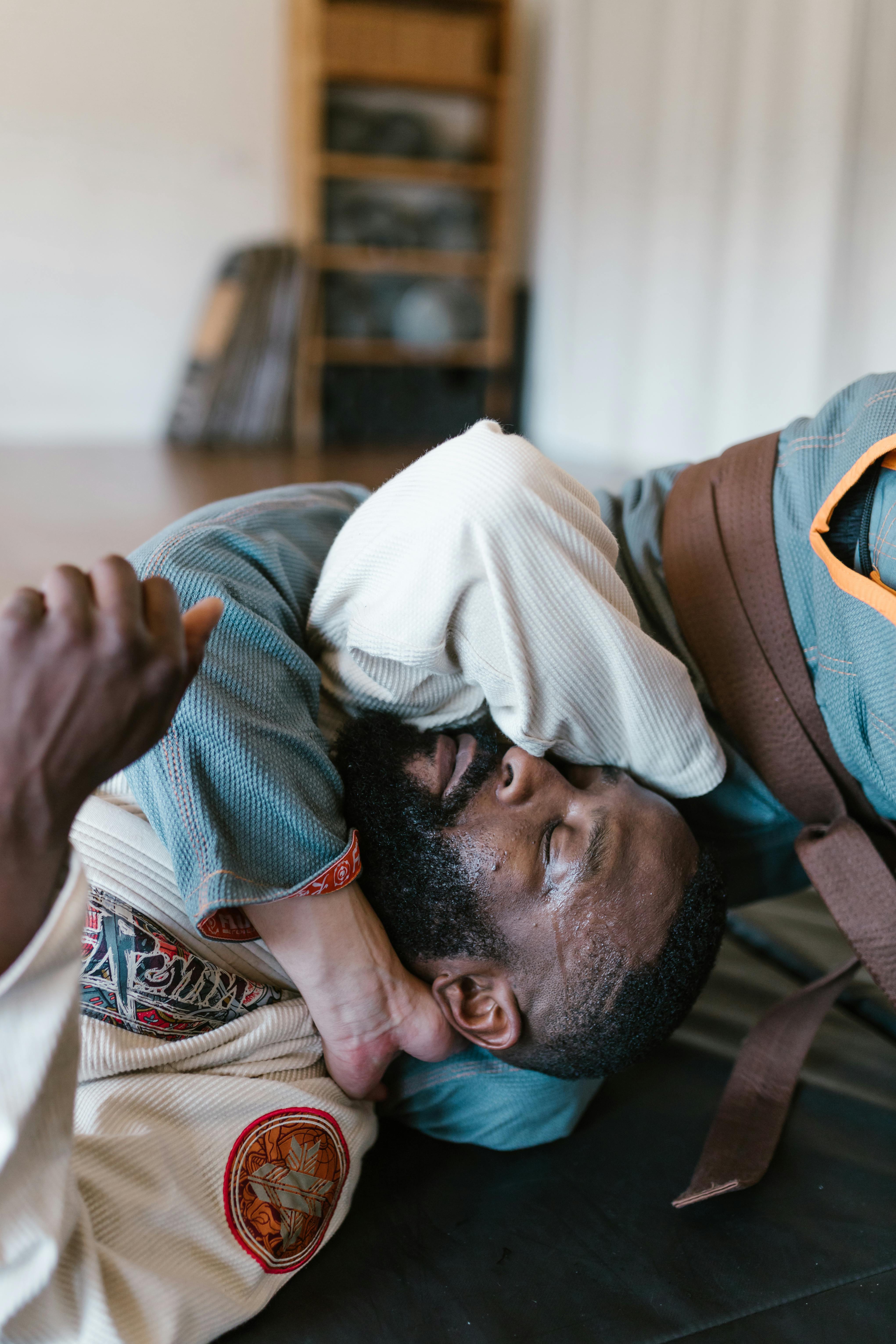 Person Breaking A Board With Karate Chop · Free Stock Photo