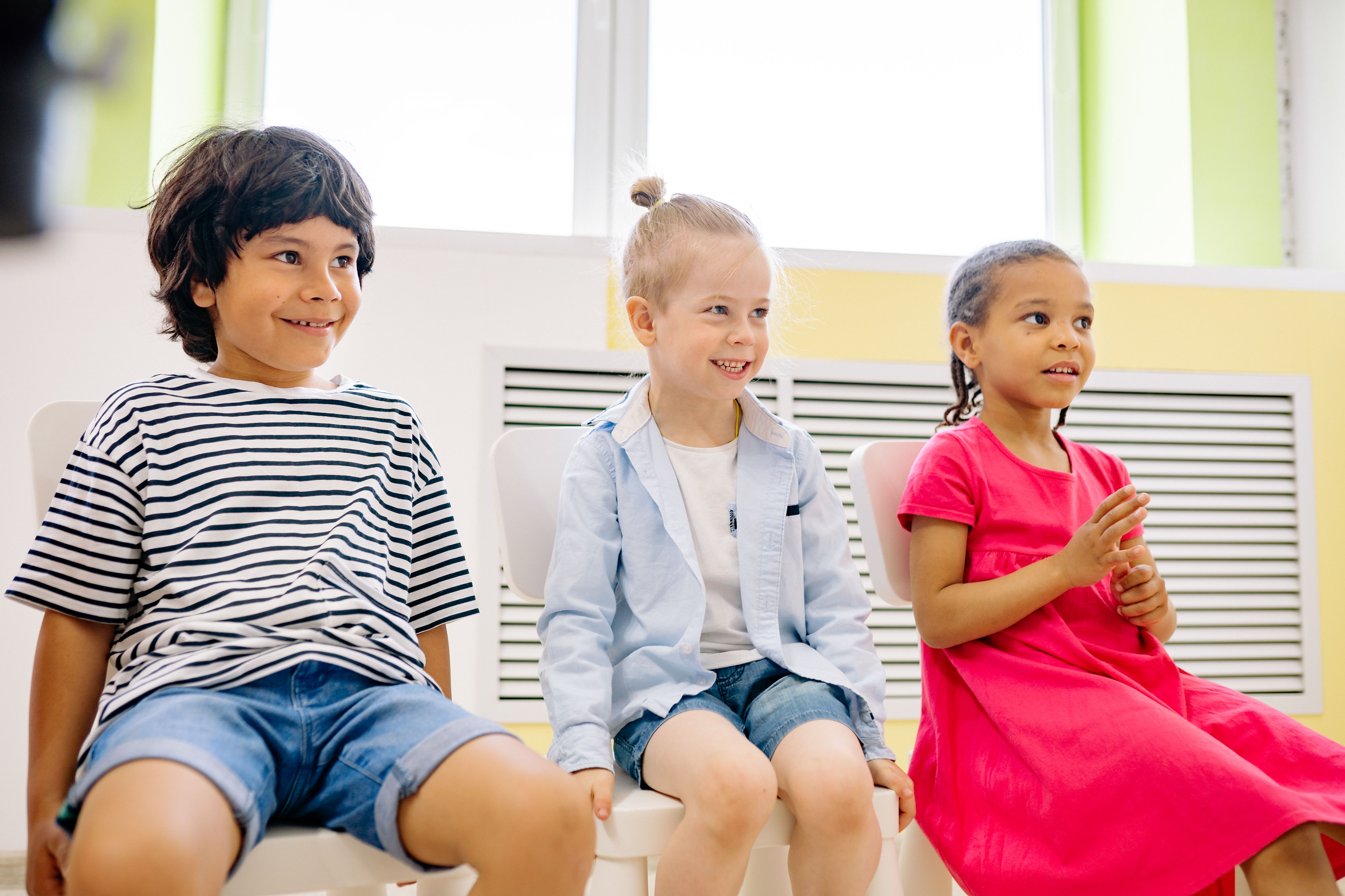Girl and Boy Talking While Sitting Inside The Classroom · Free Stock Photo