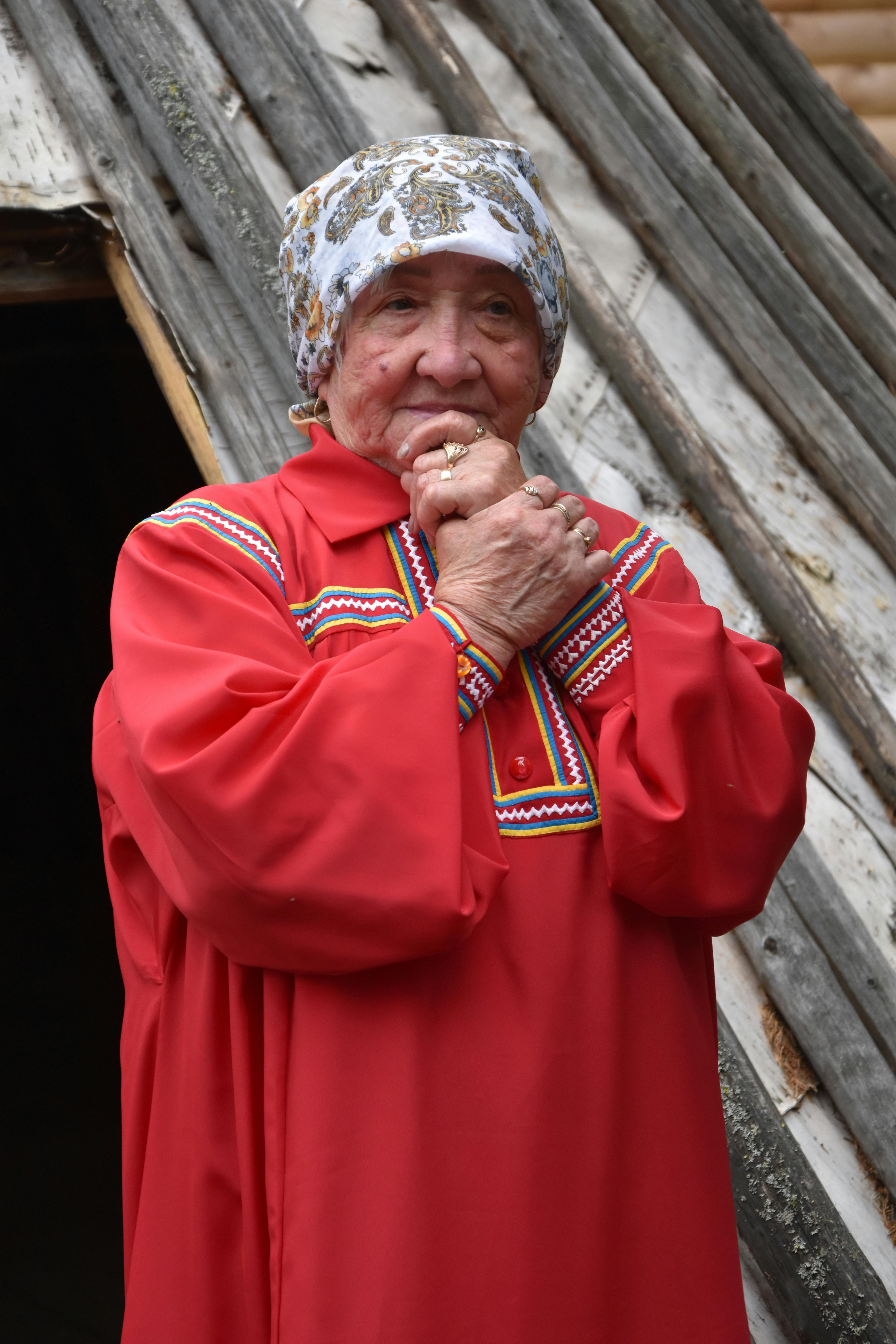 Beautiful Woman in Traditional Clothing with hand on Head · Free Stock ...
