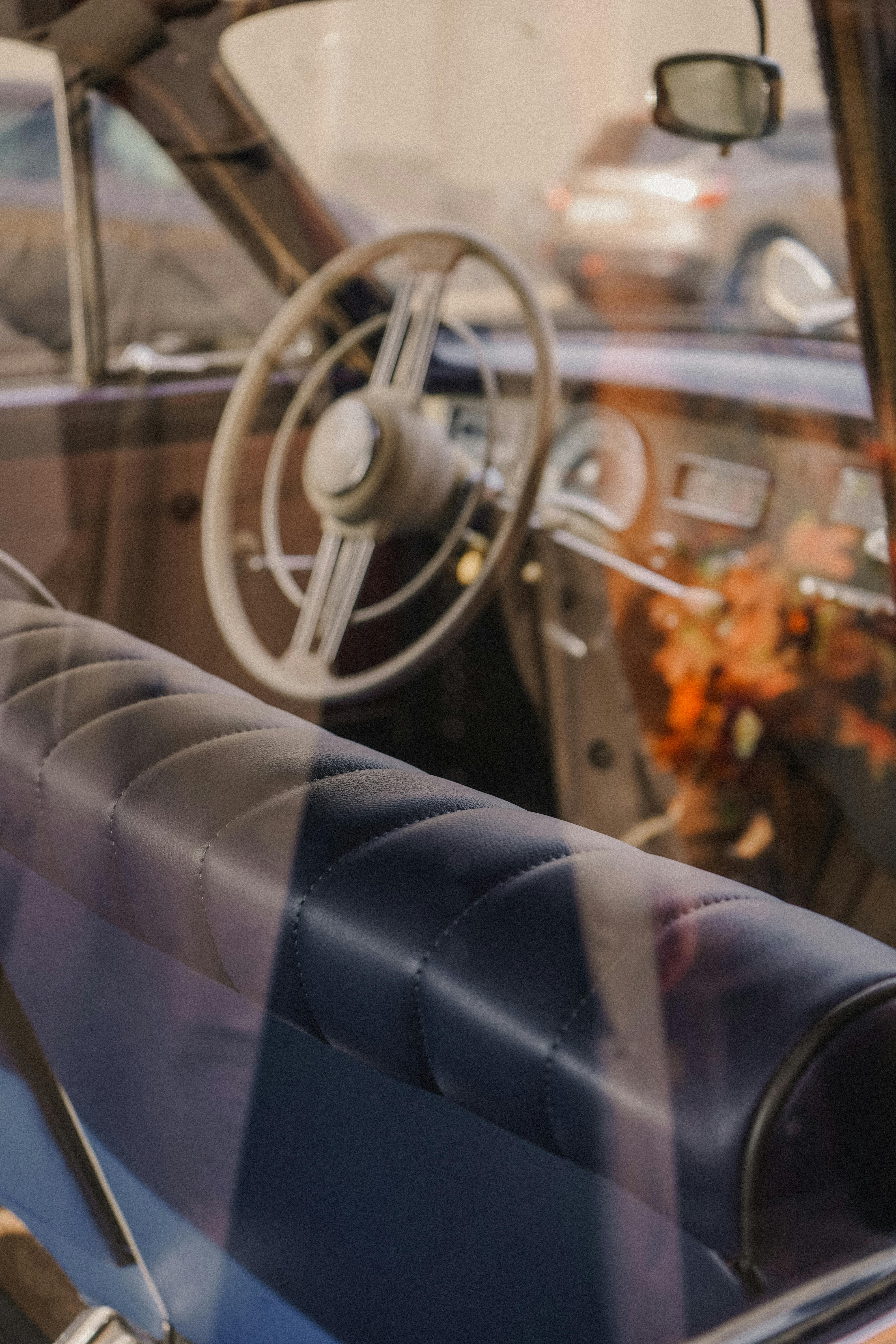 Steering Wheel of Car behind Window · Free Stock Photo