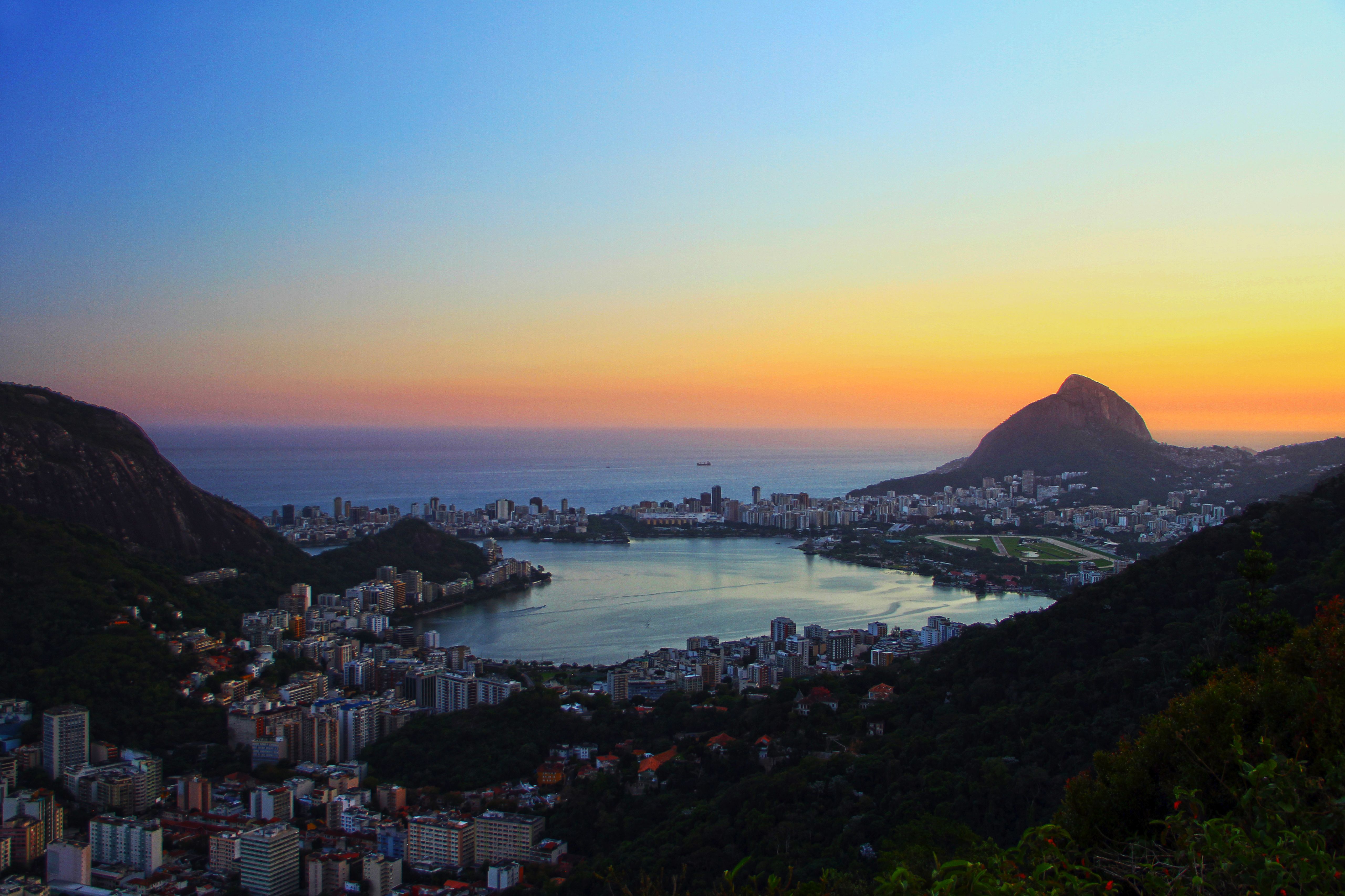 City Near Body of Water during Sunset · Free Stock Photo