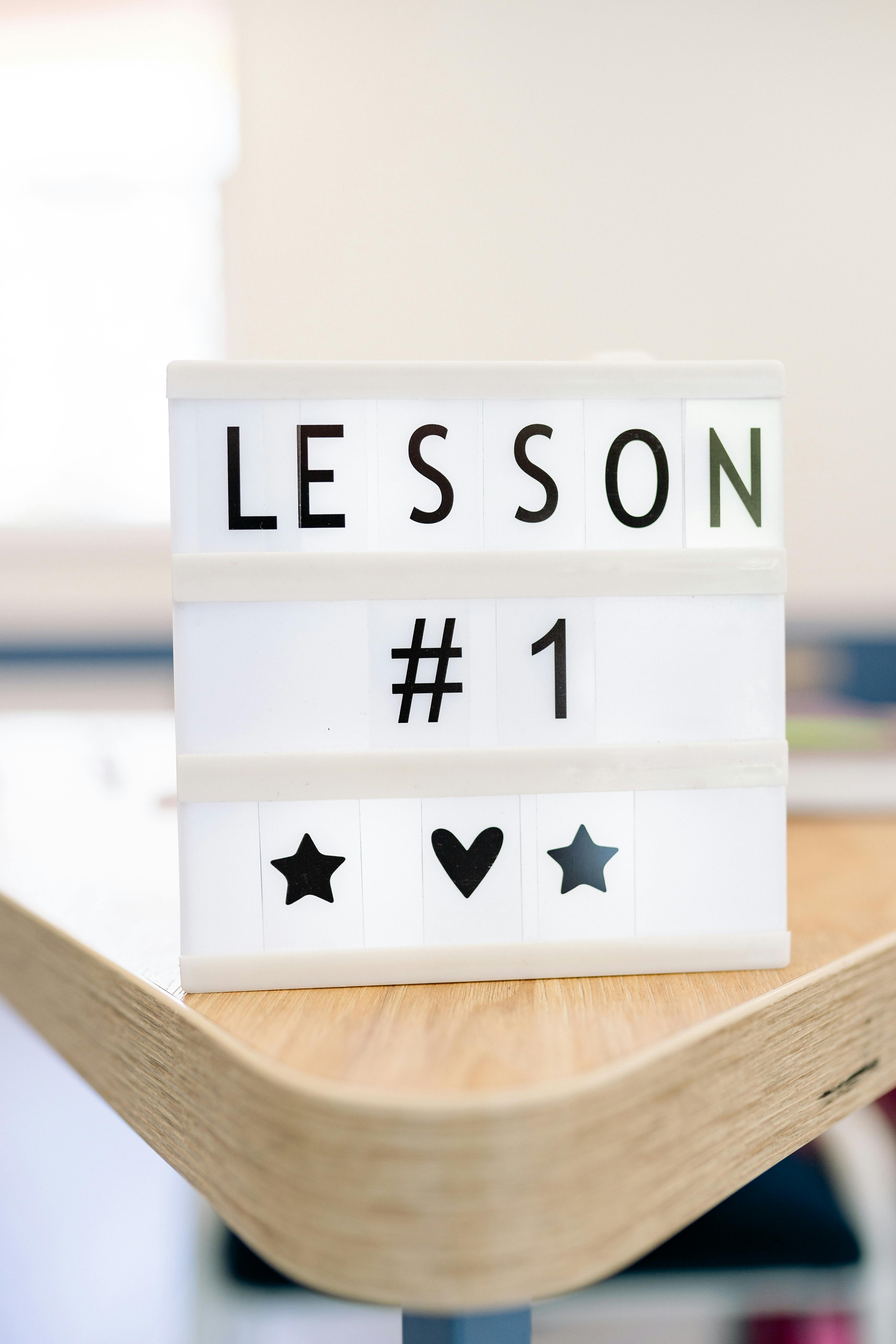 Board with Lesson 1 on Table · Free Stock Photo