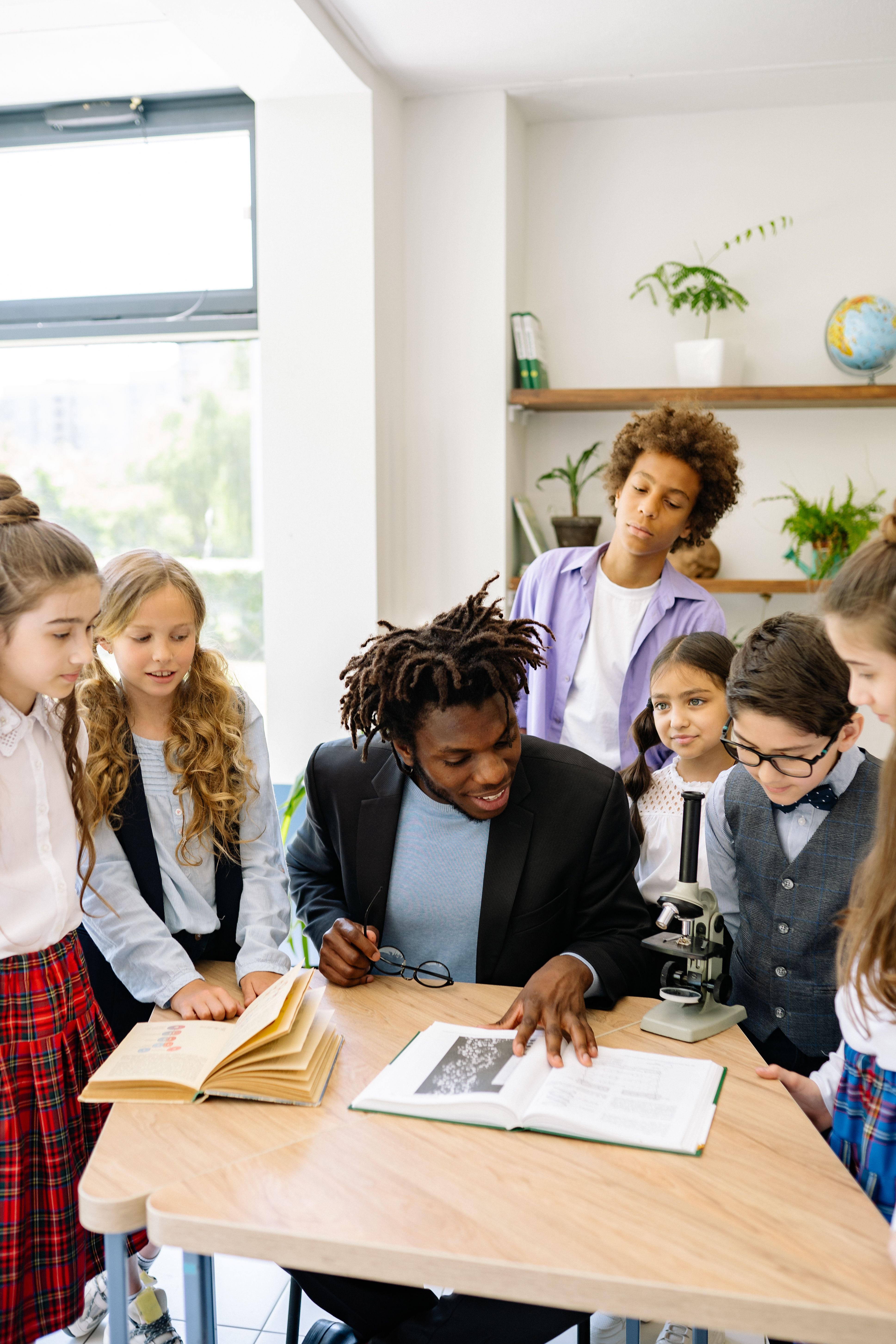 Teacher with the Students Walking in the School · Free Stock Photo