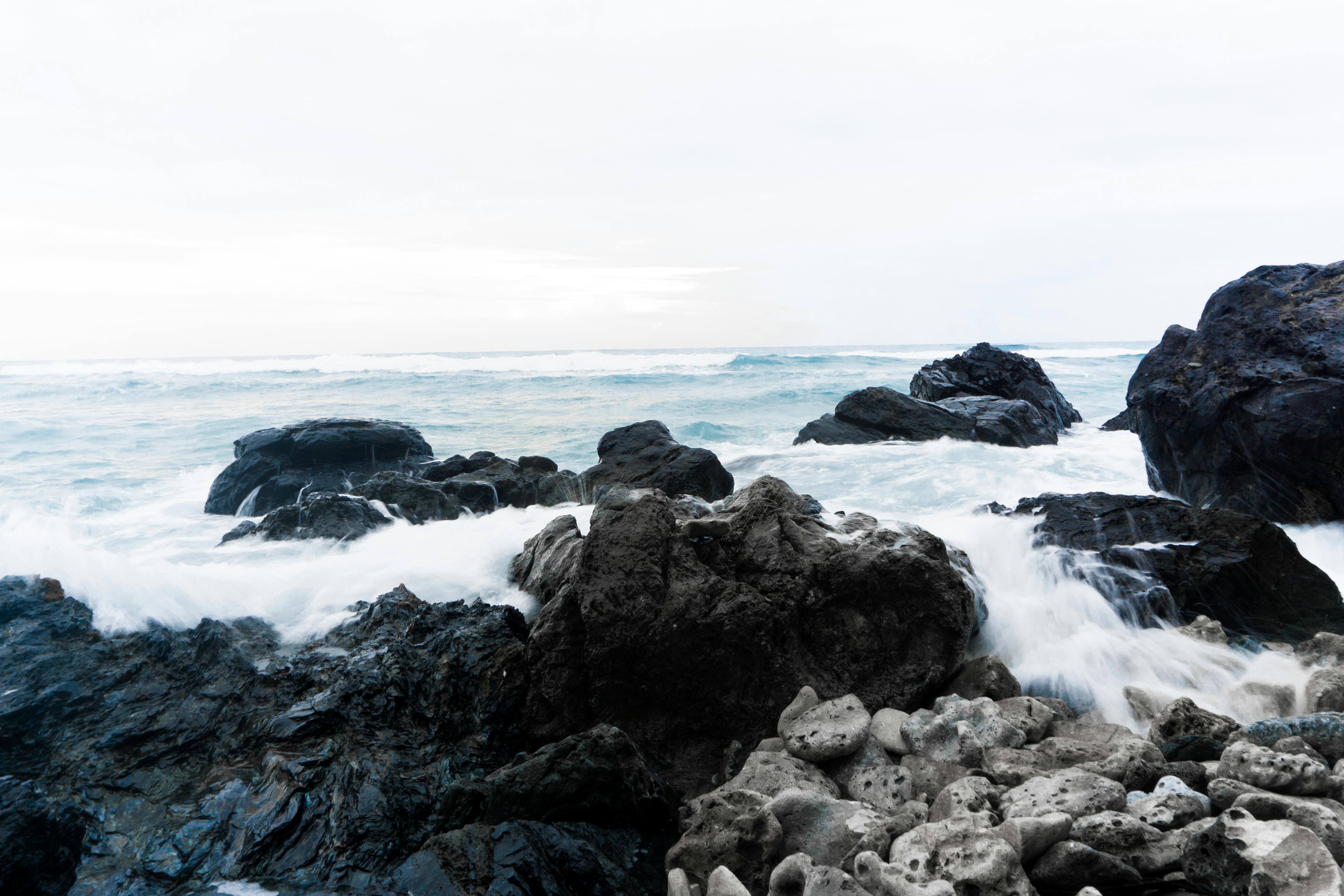 Blue Ocean Shore during Daytime · Free Stock Photo