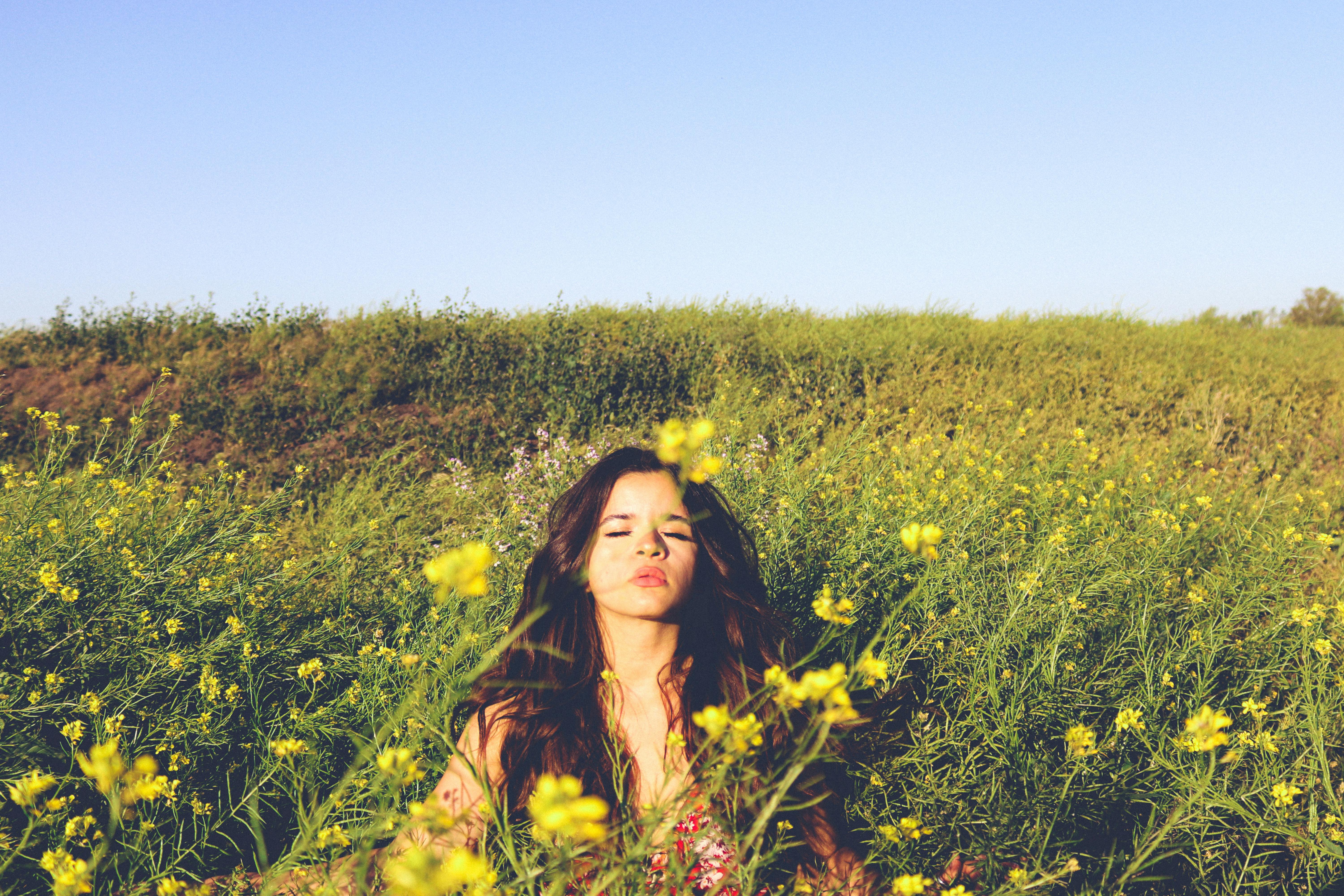 A Woman in a Flower Field · Free Stock Photo