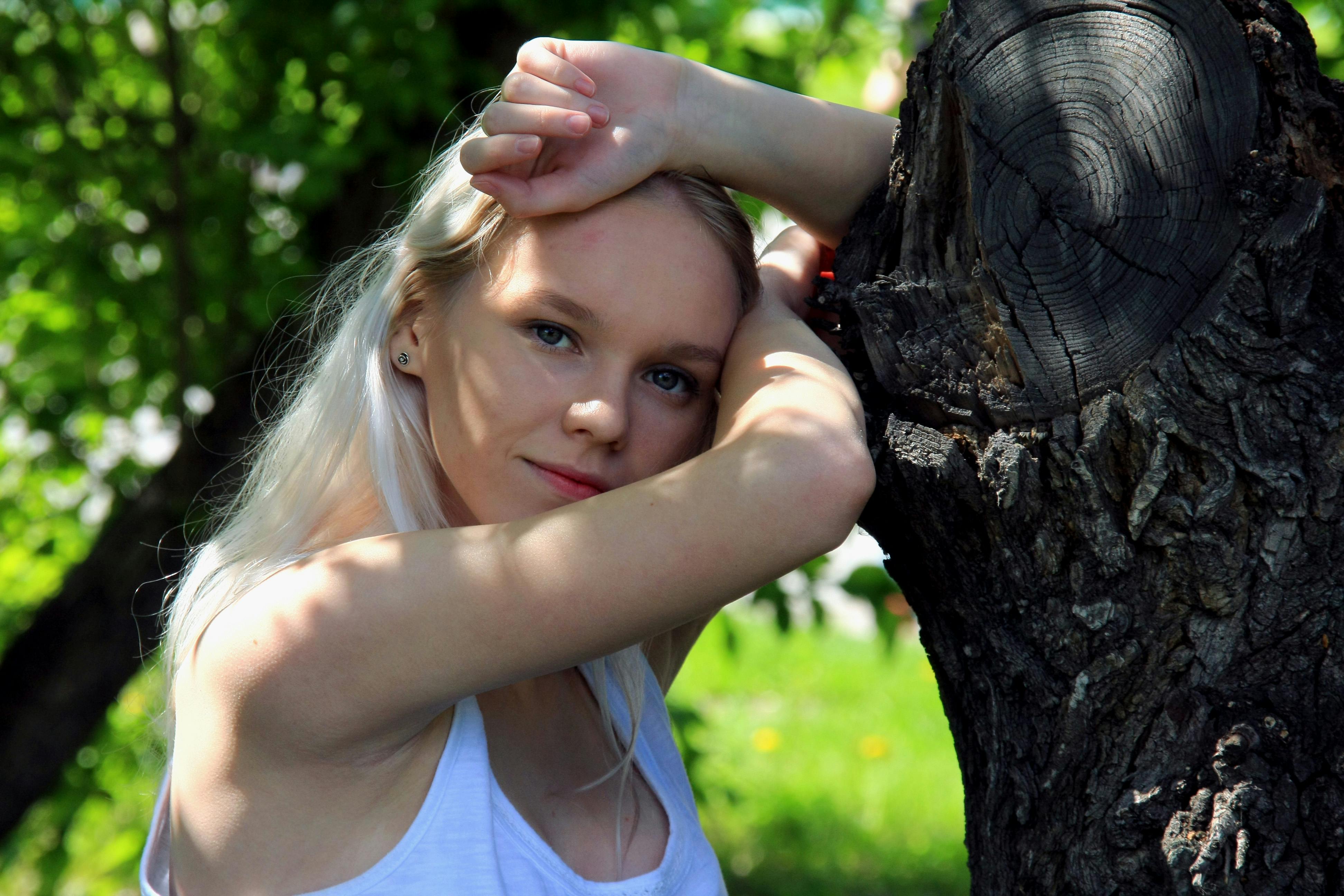A Girl Leaning on the Tree · Free Stock Photo