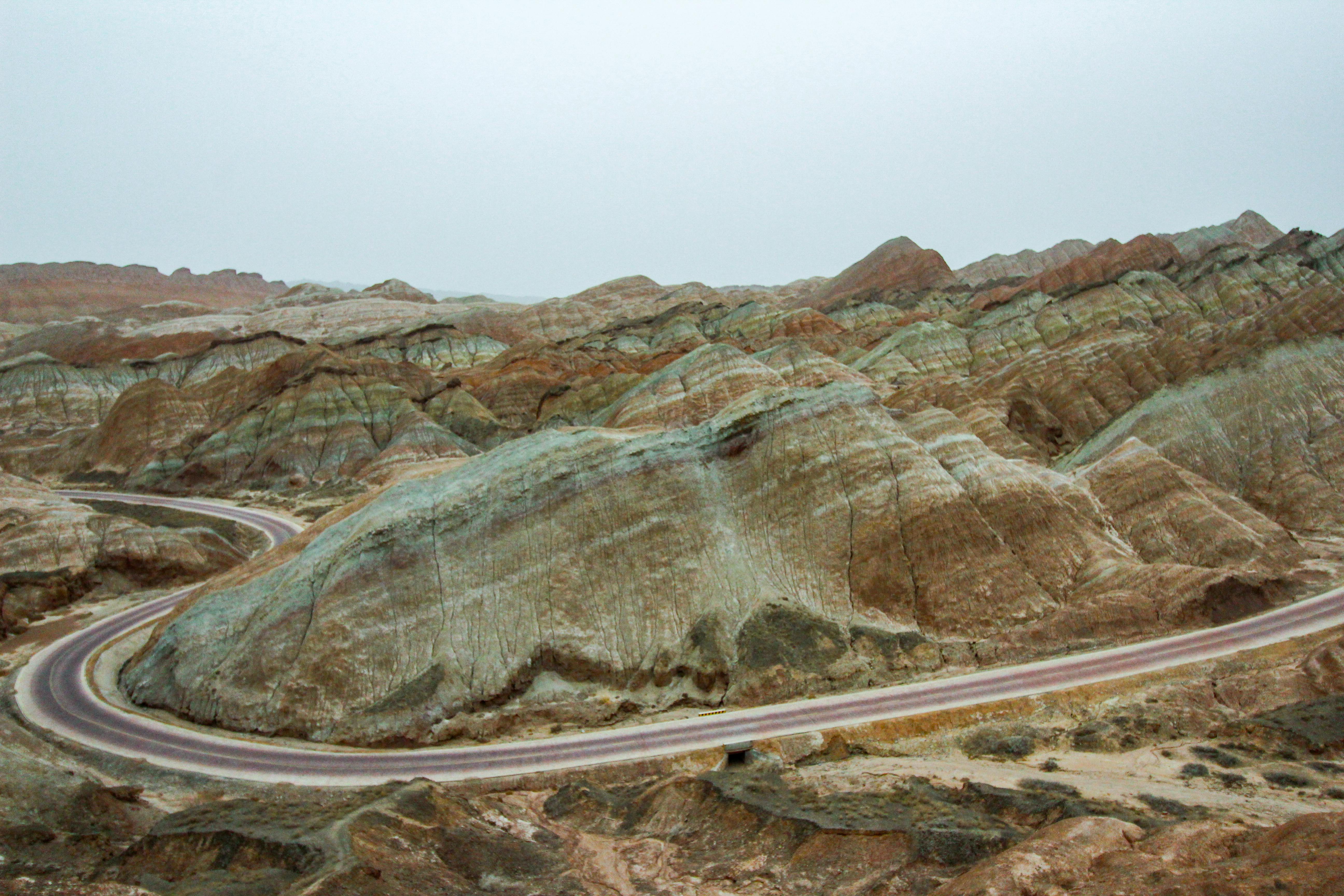 Road in Rock Formations Landscape · Free Stock Photo