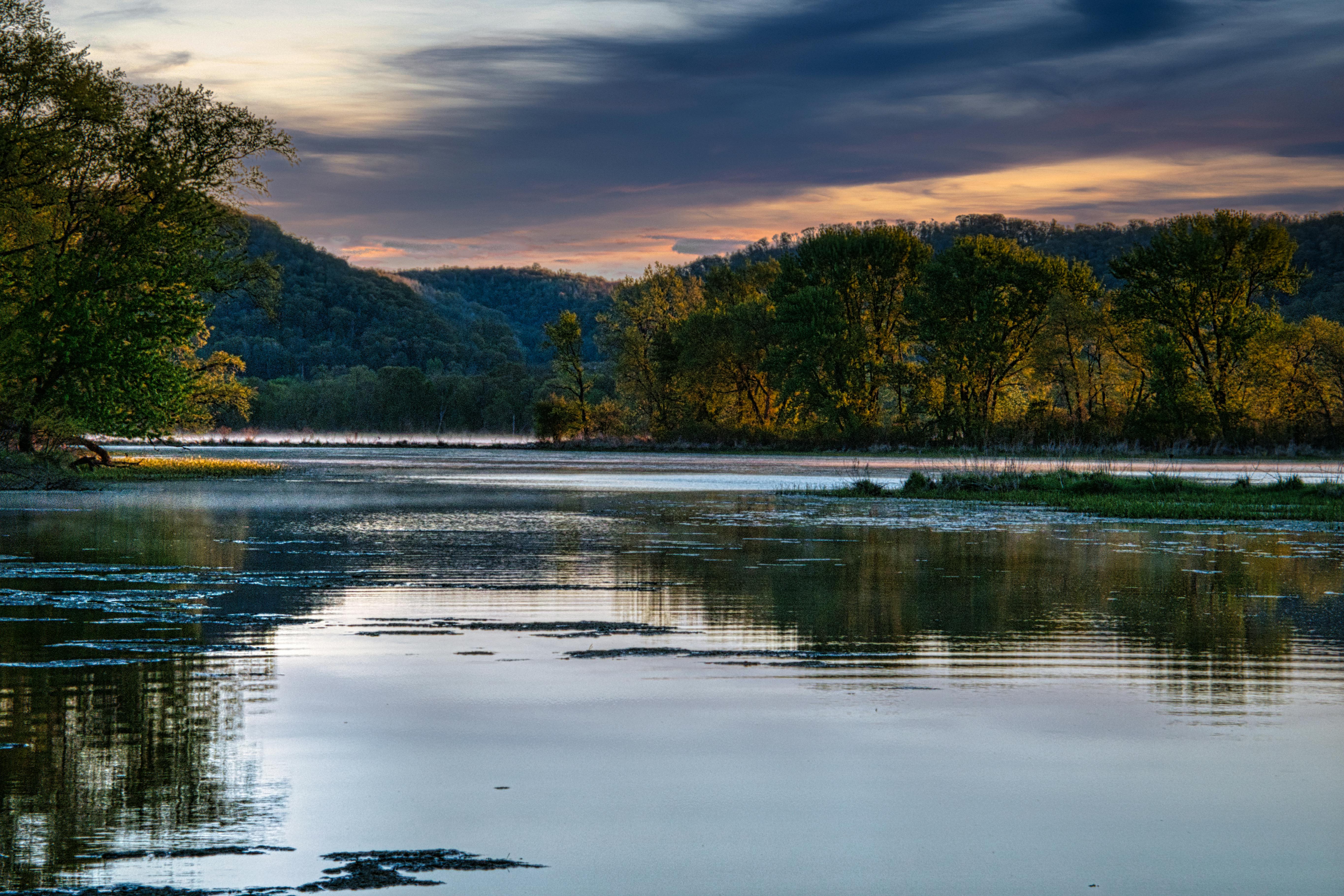 A River under a Cloudy Sky · Free Stock Photo