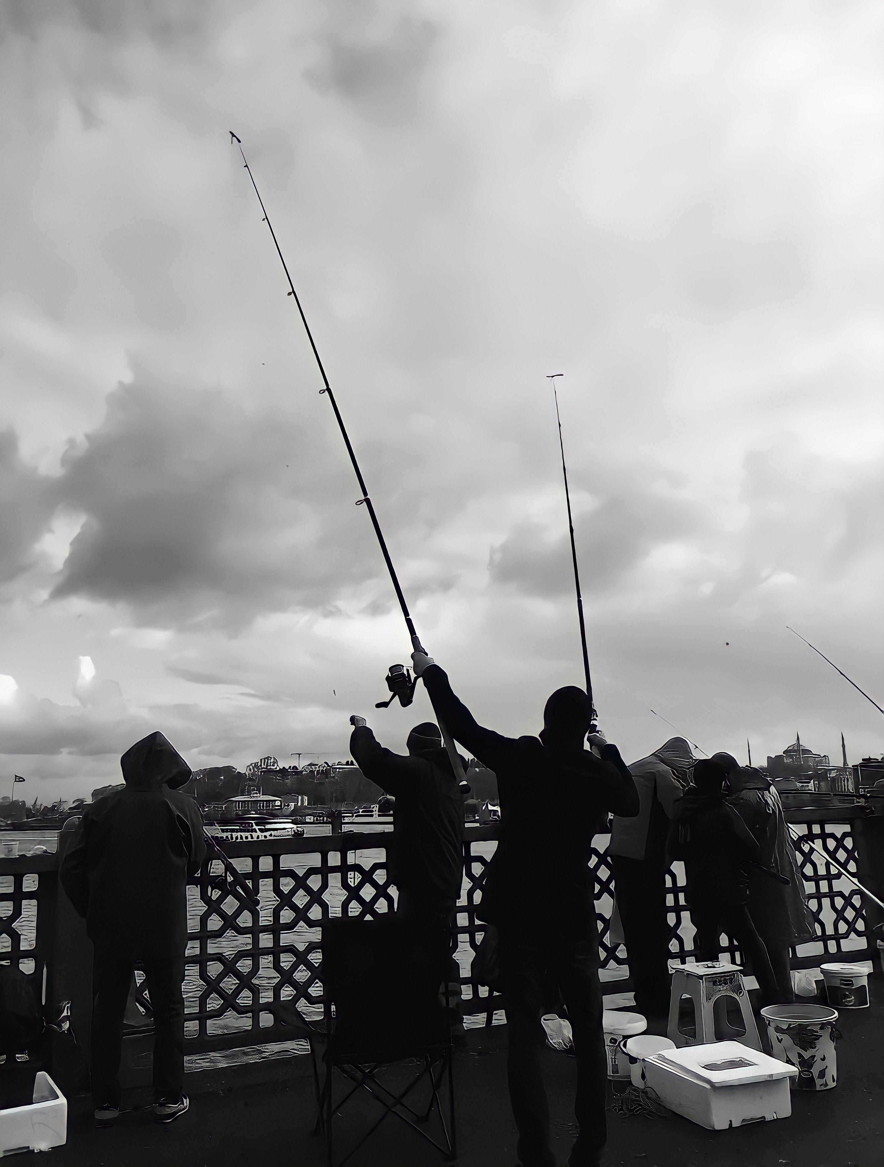 People with Rods Fishing from Bridge · Free Stock Photo