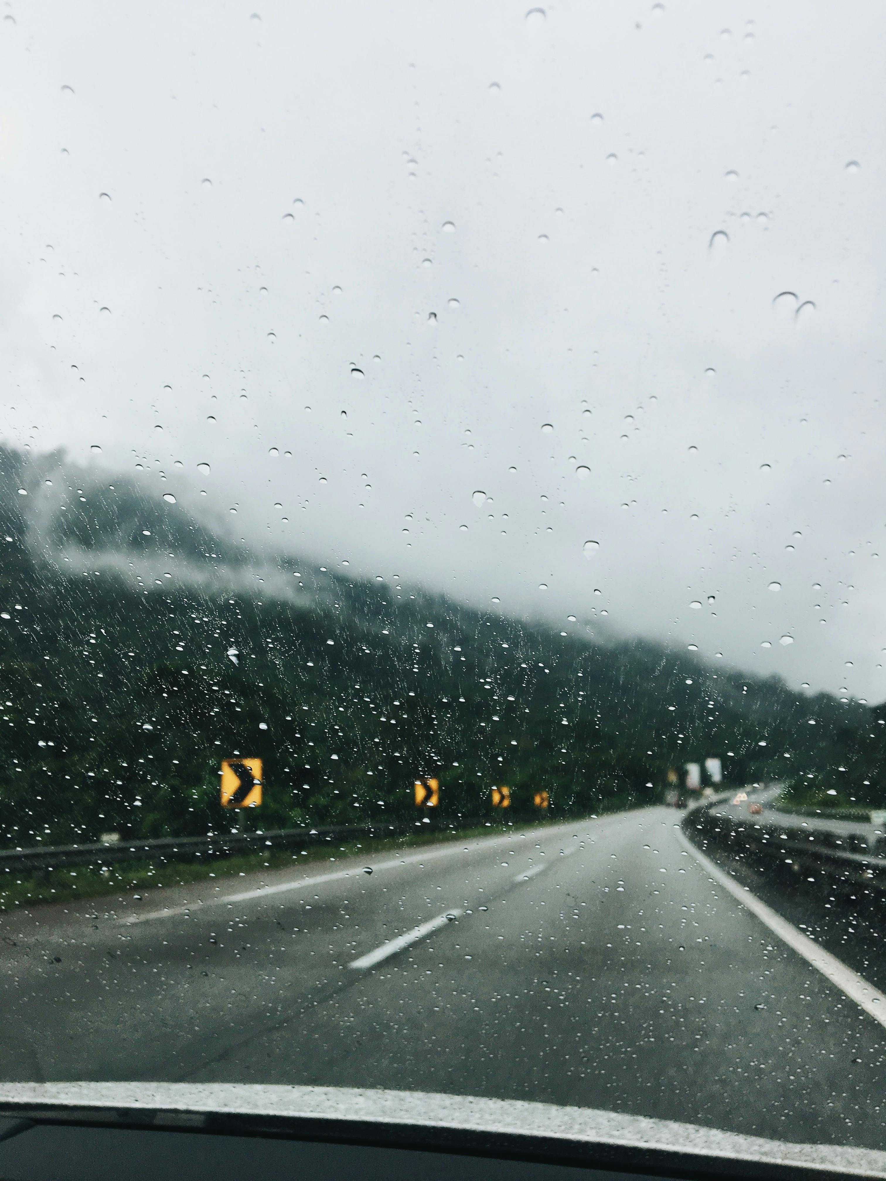 A View of the Road from inside a Car on a Rainy Day · Free Stock Photo