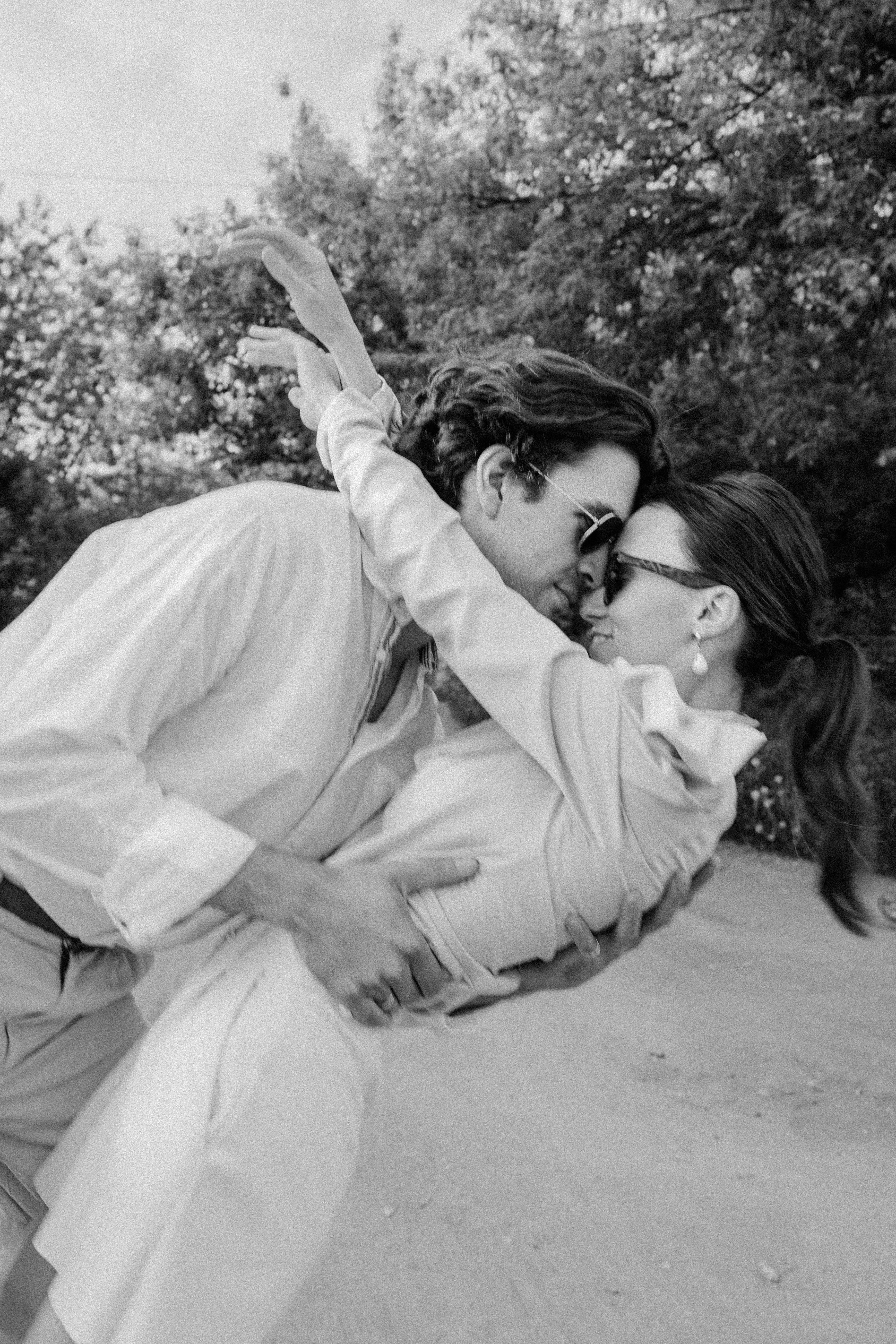 Grayscale Photo of a Romantic Couple Hugging · Free Stock Photo