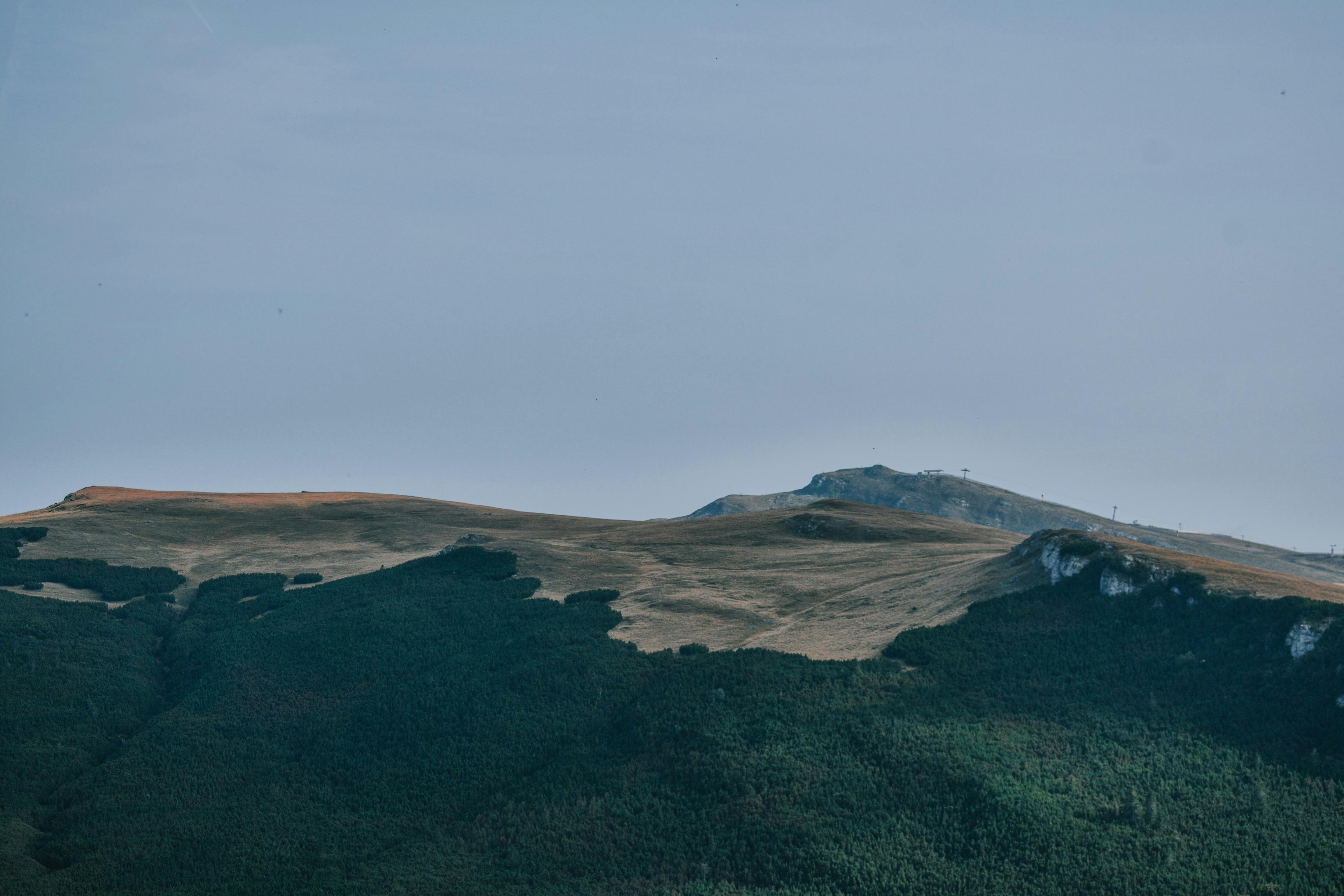 Person Bungee Jumping Over Valley · Free Stock Photo