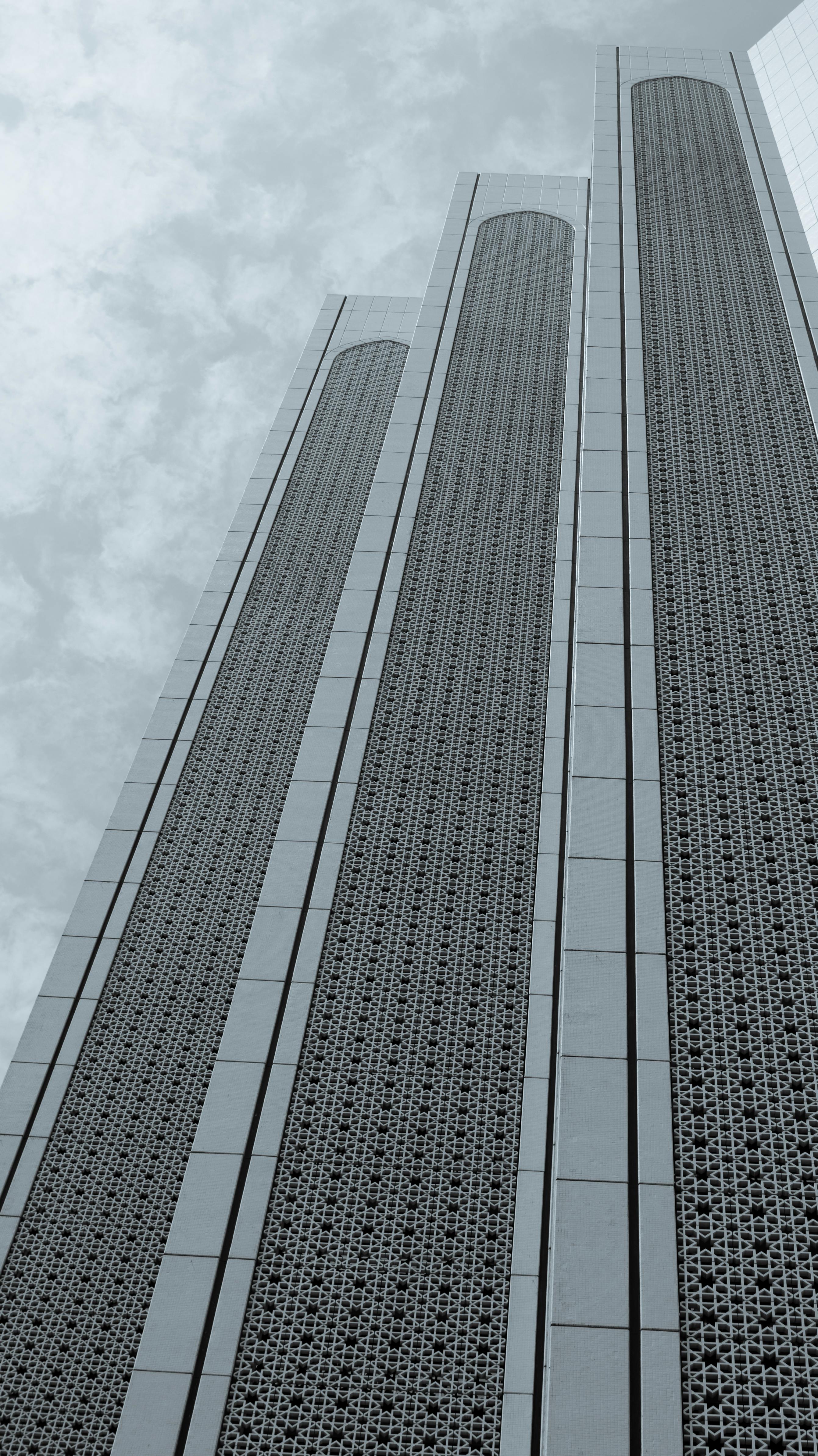 Grayscale Photo of a High-Rise Building · Free Stock Photo