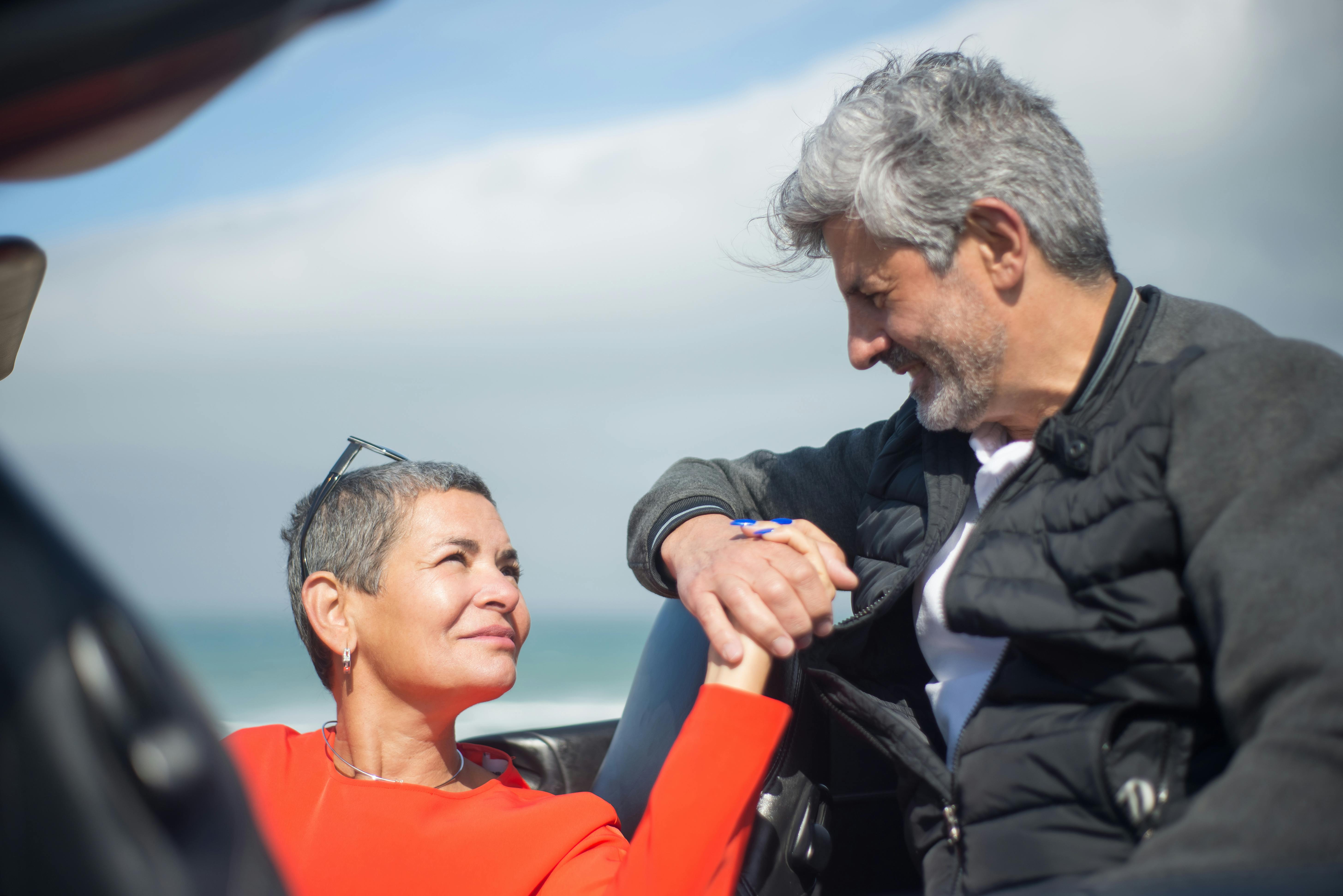 A Woman Sitting on the Lap of a Man · Free Stock Photo