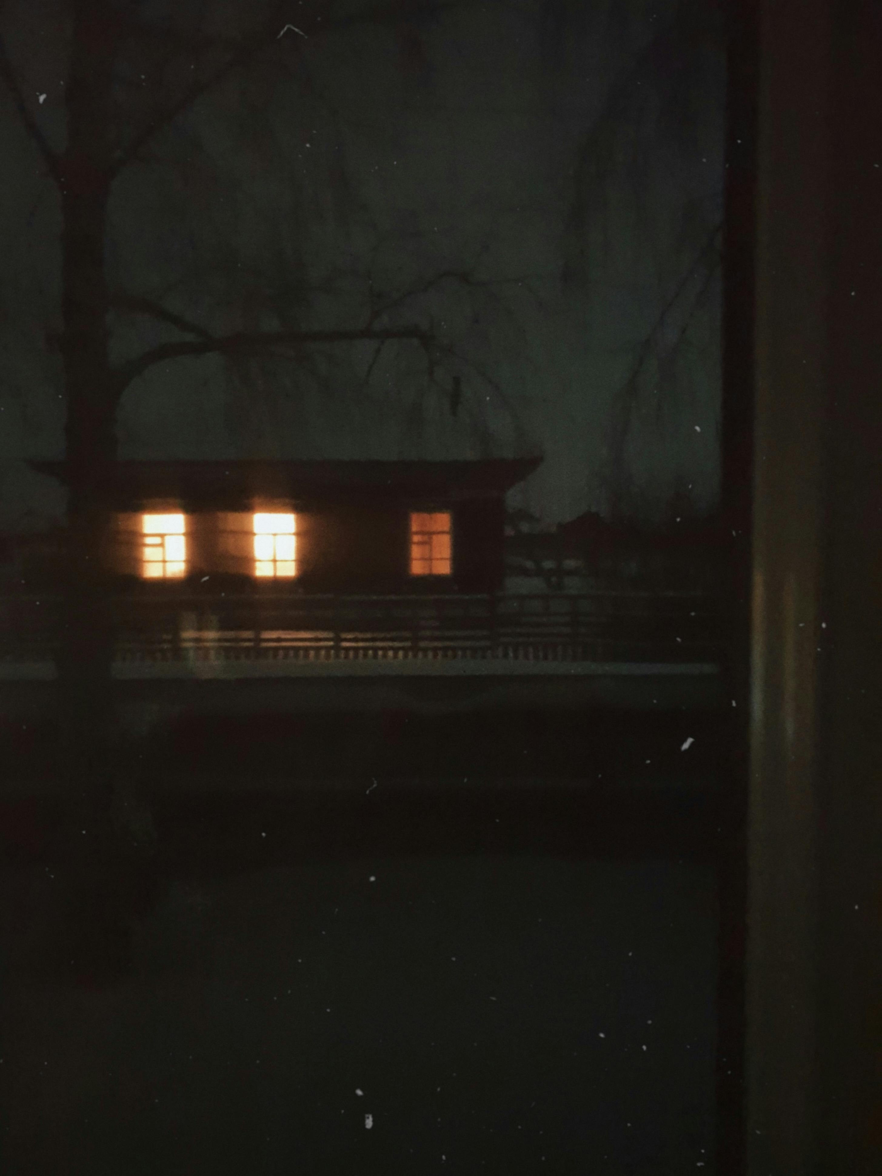 Photo of a Wooden House with Violet Illuminated Window at Night · Free ...