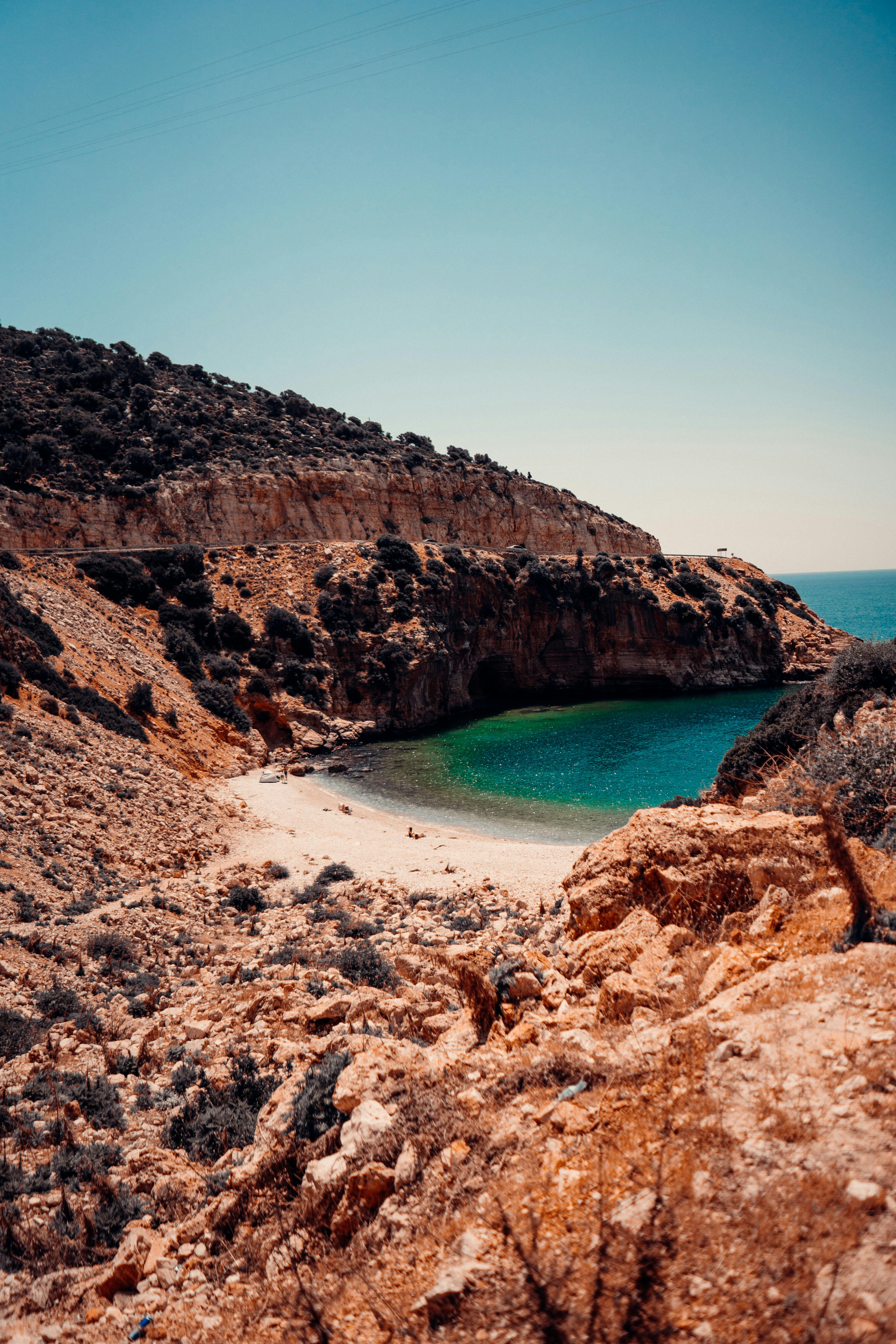 Green Cliffs near Sea Water · Free Stock Photo