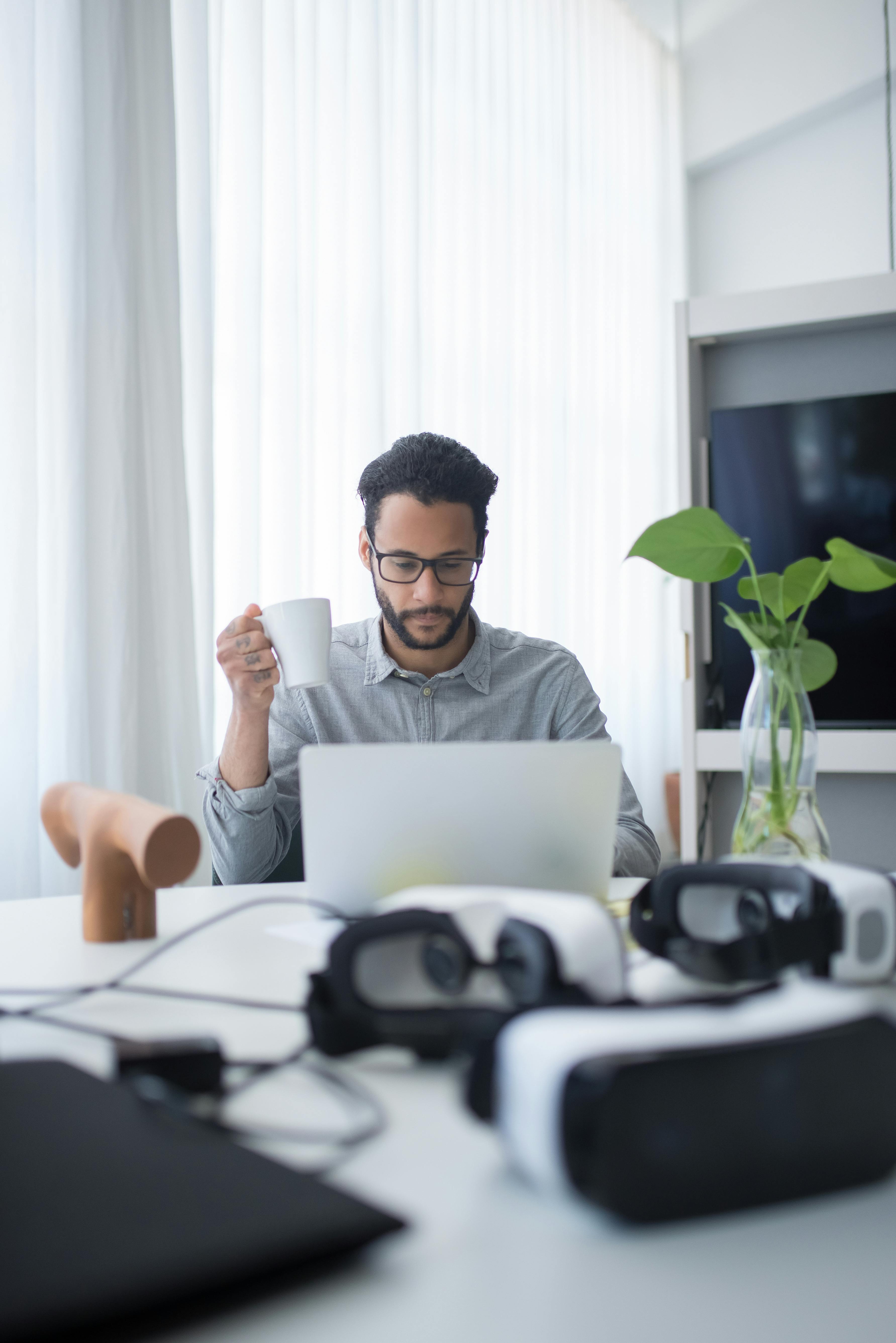 Man Using Silver Laptop Beside Another Man · Free Stock Photo