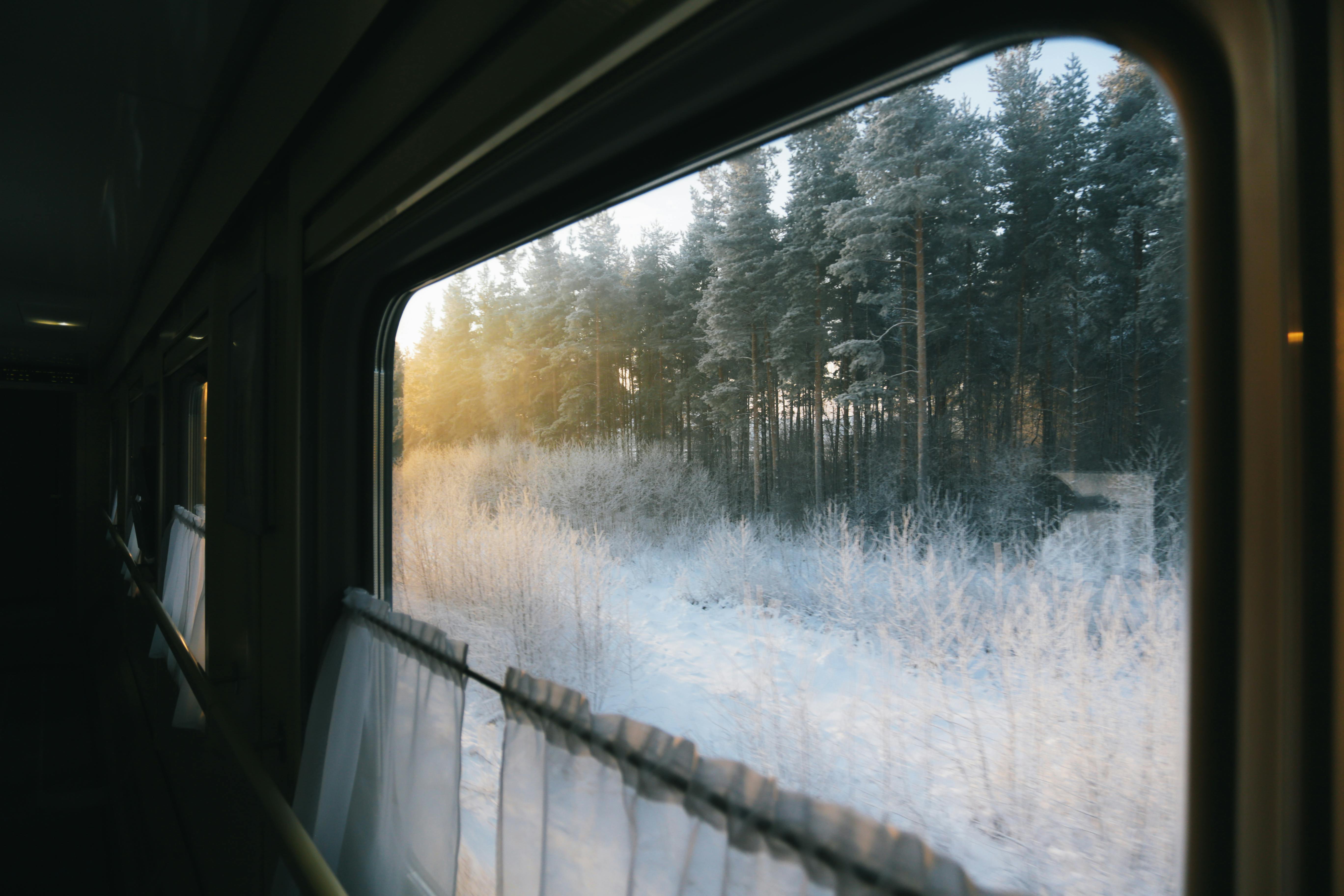 Train Glass Window in Close Up Photography · Free Stock Photo