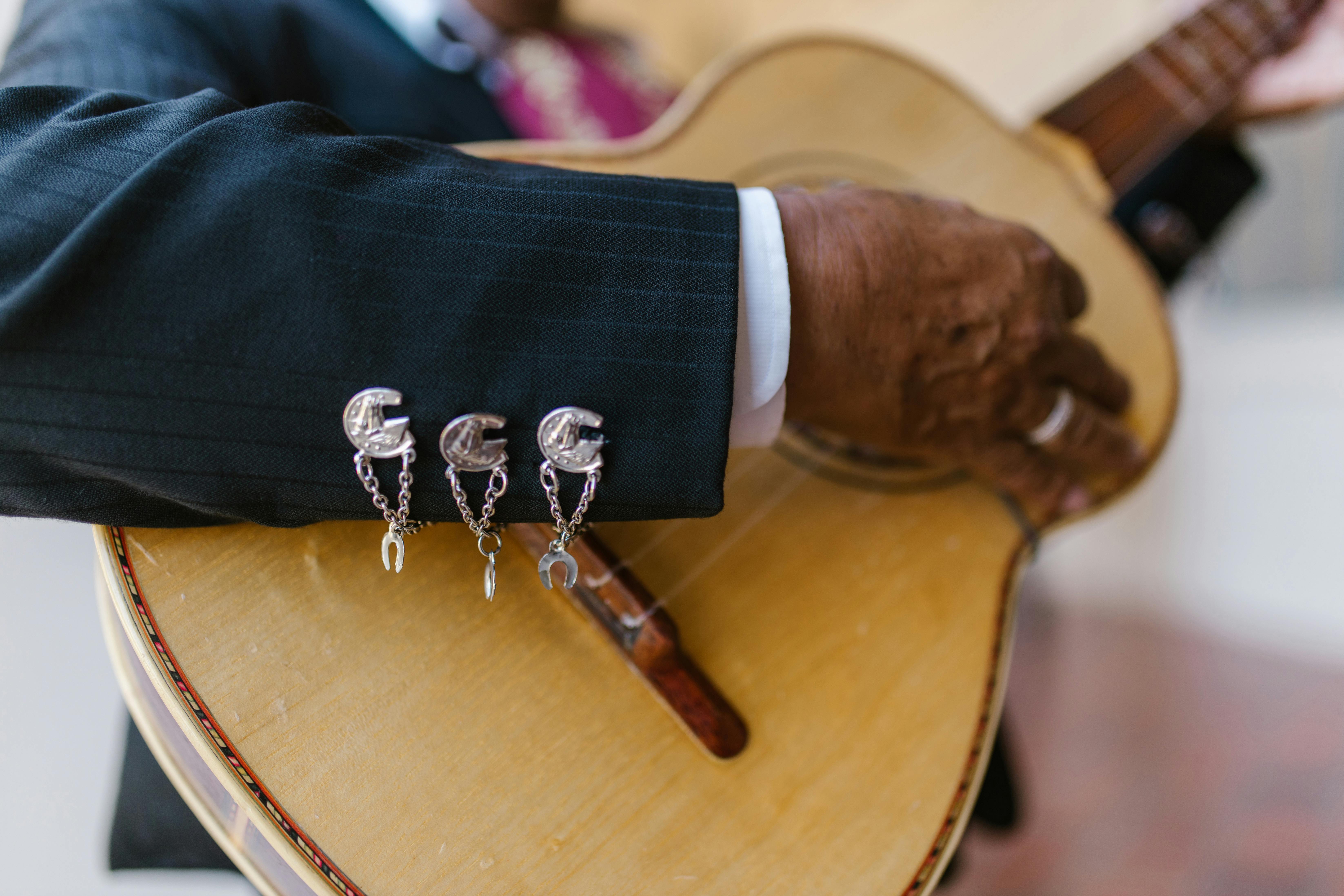 Man Playing Triangle Instrument · Free Stock Photo