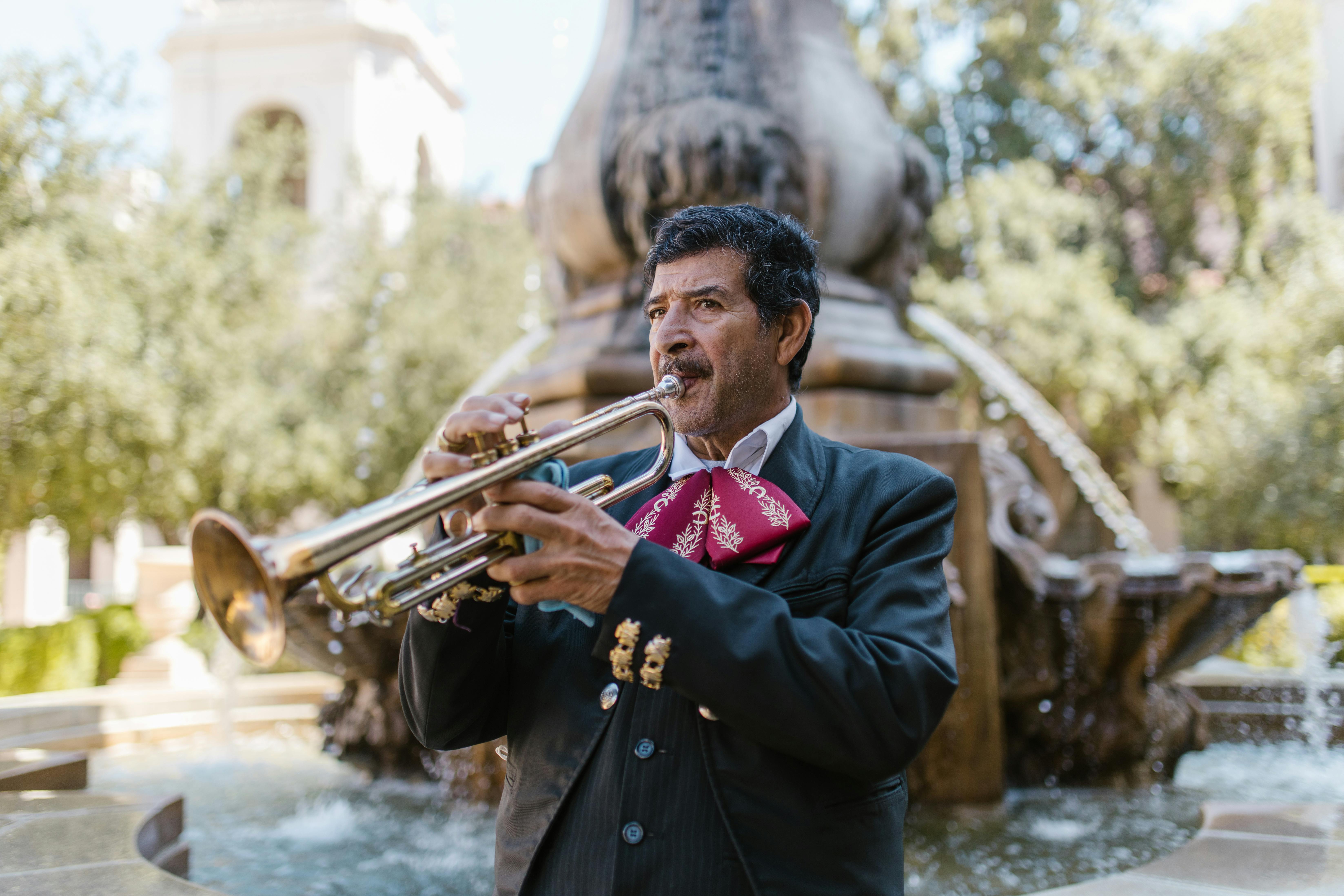 A Man Playing a Trumpet · Free Stock Photo