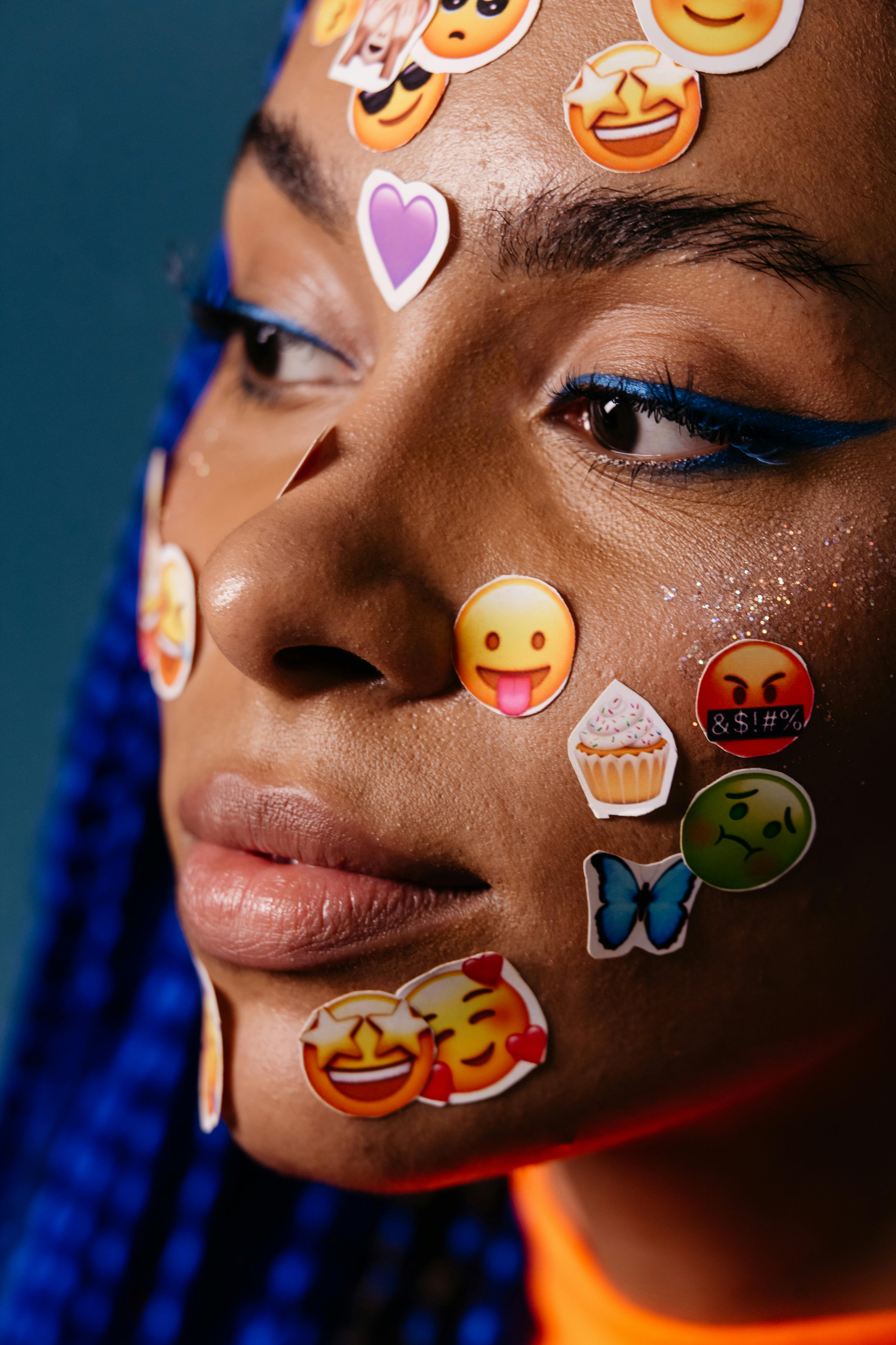 A Woman With Stickers on Her Face · Free Stock Photo