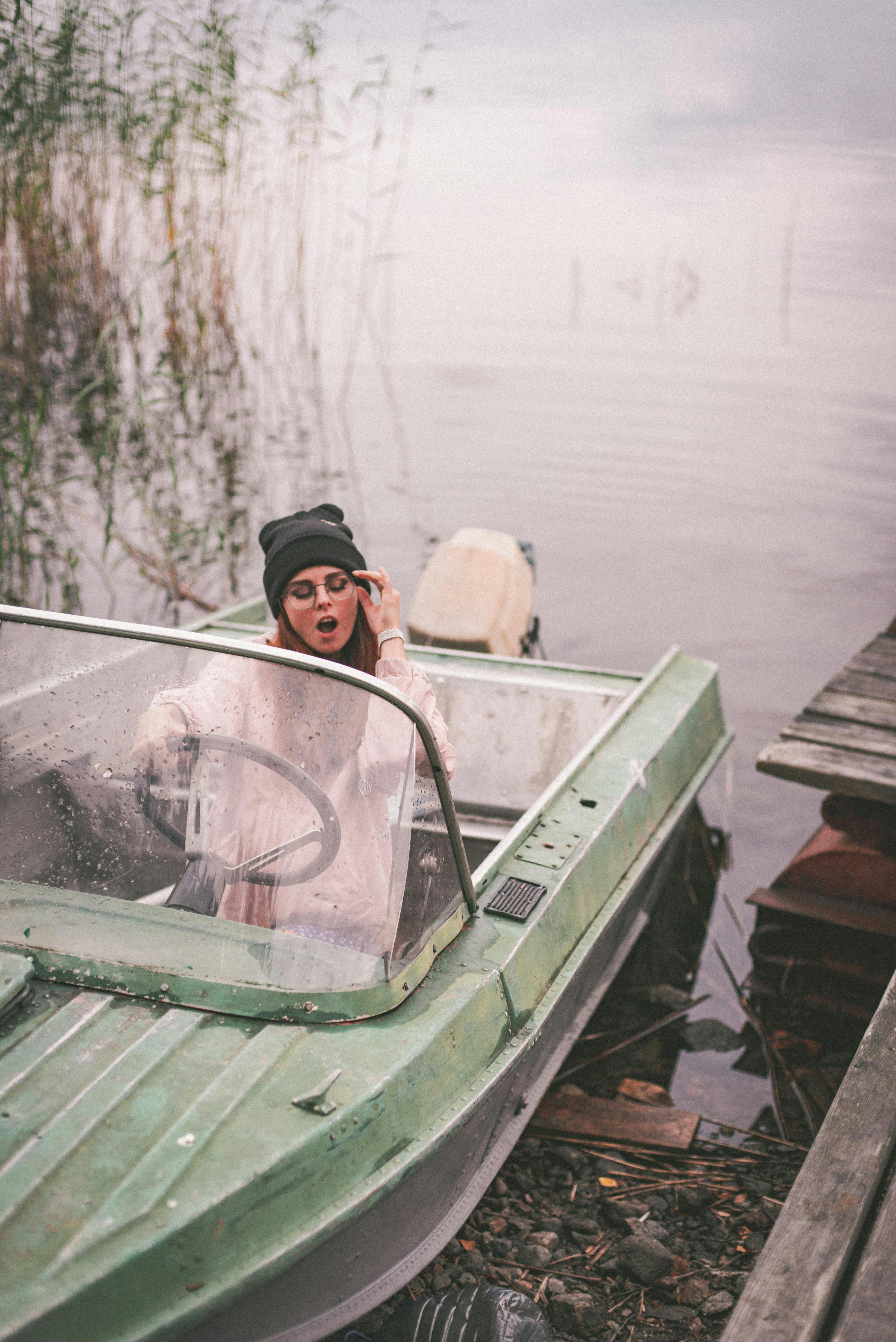 A Woman Riding a Boat · Free Stock Photo