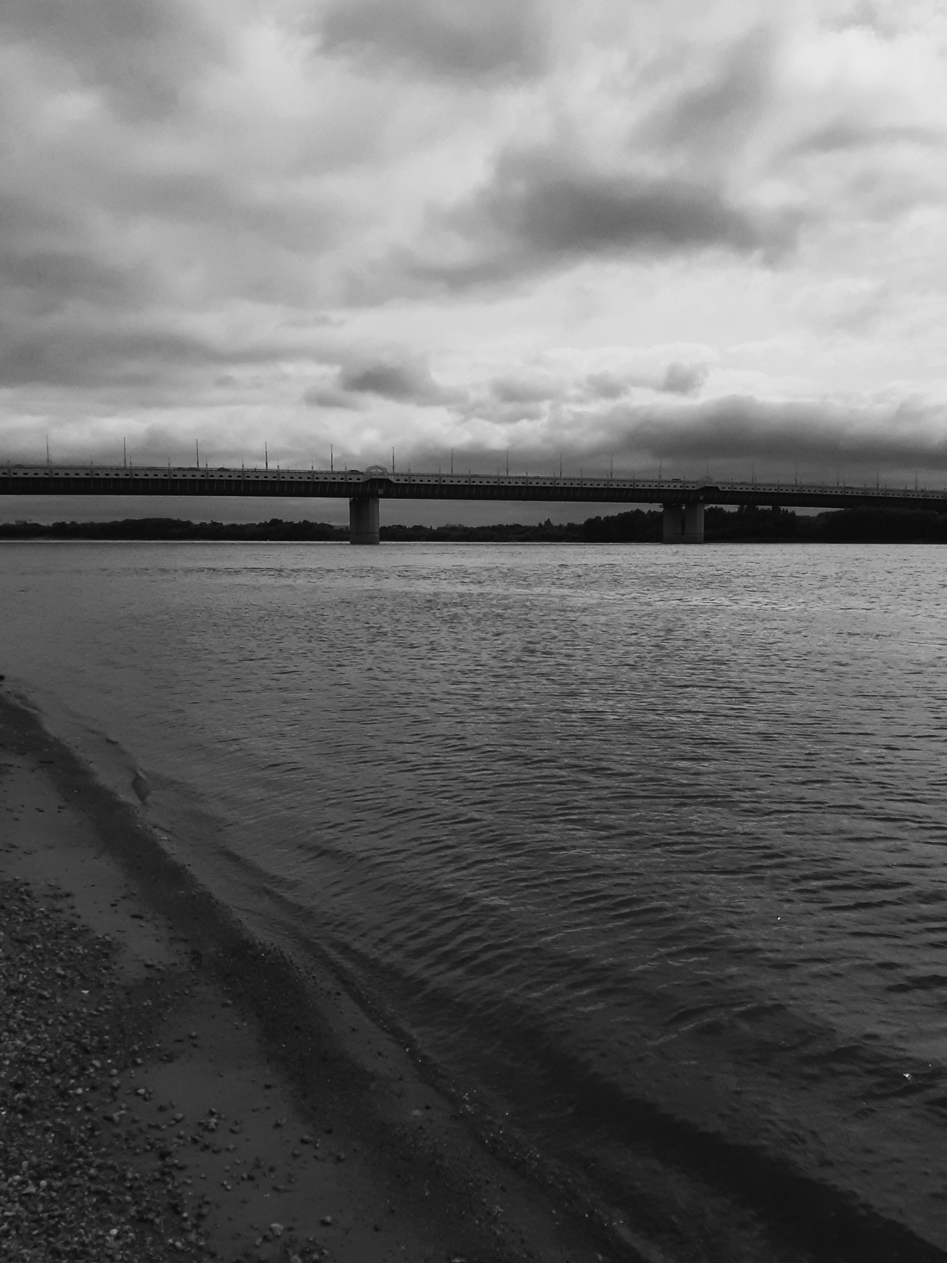 Grayscale Photo of Bridge over Water · Free Stock Photo
