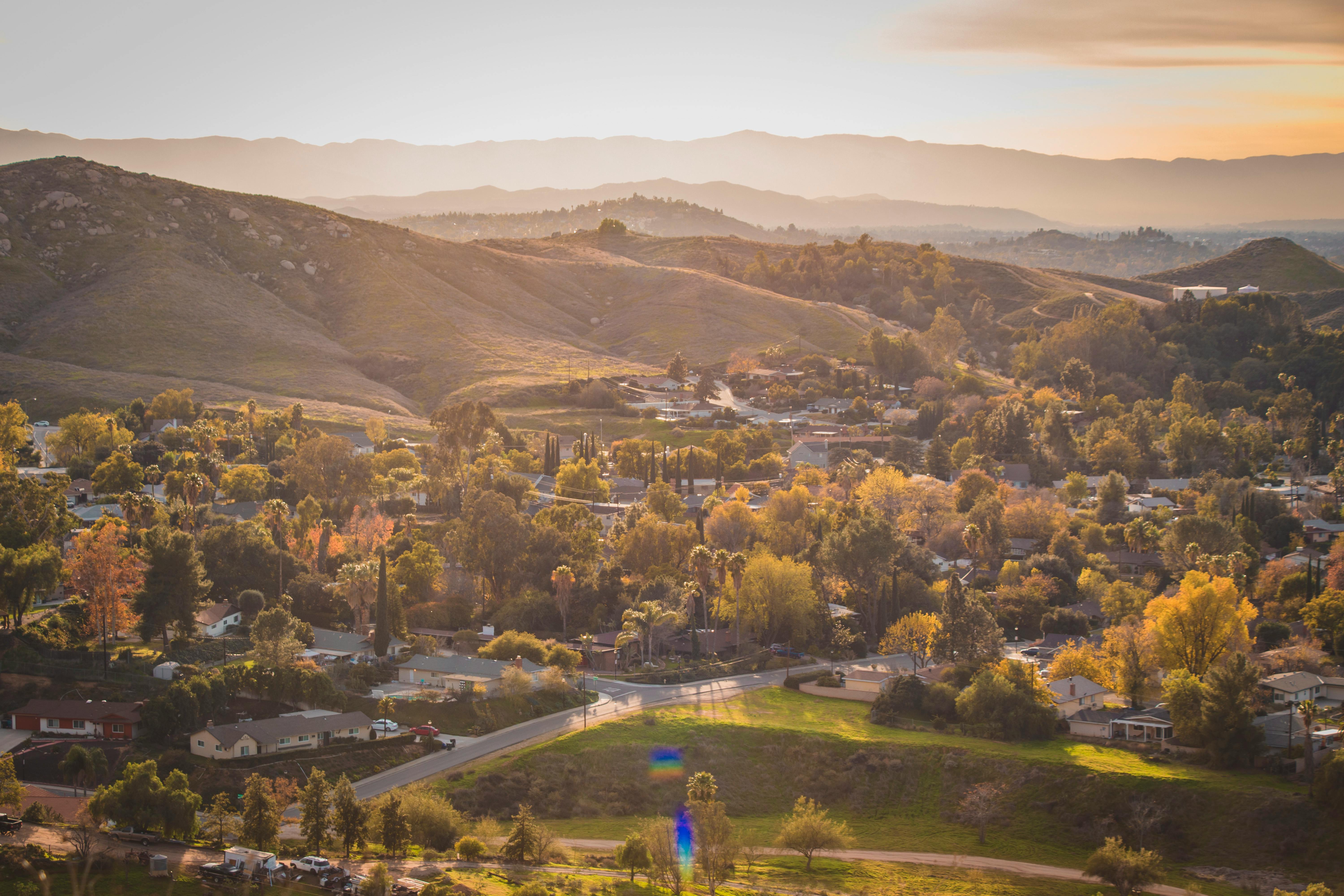 Aerial View of Houses in a Valley · Free Stock Photo