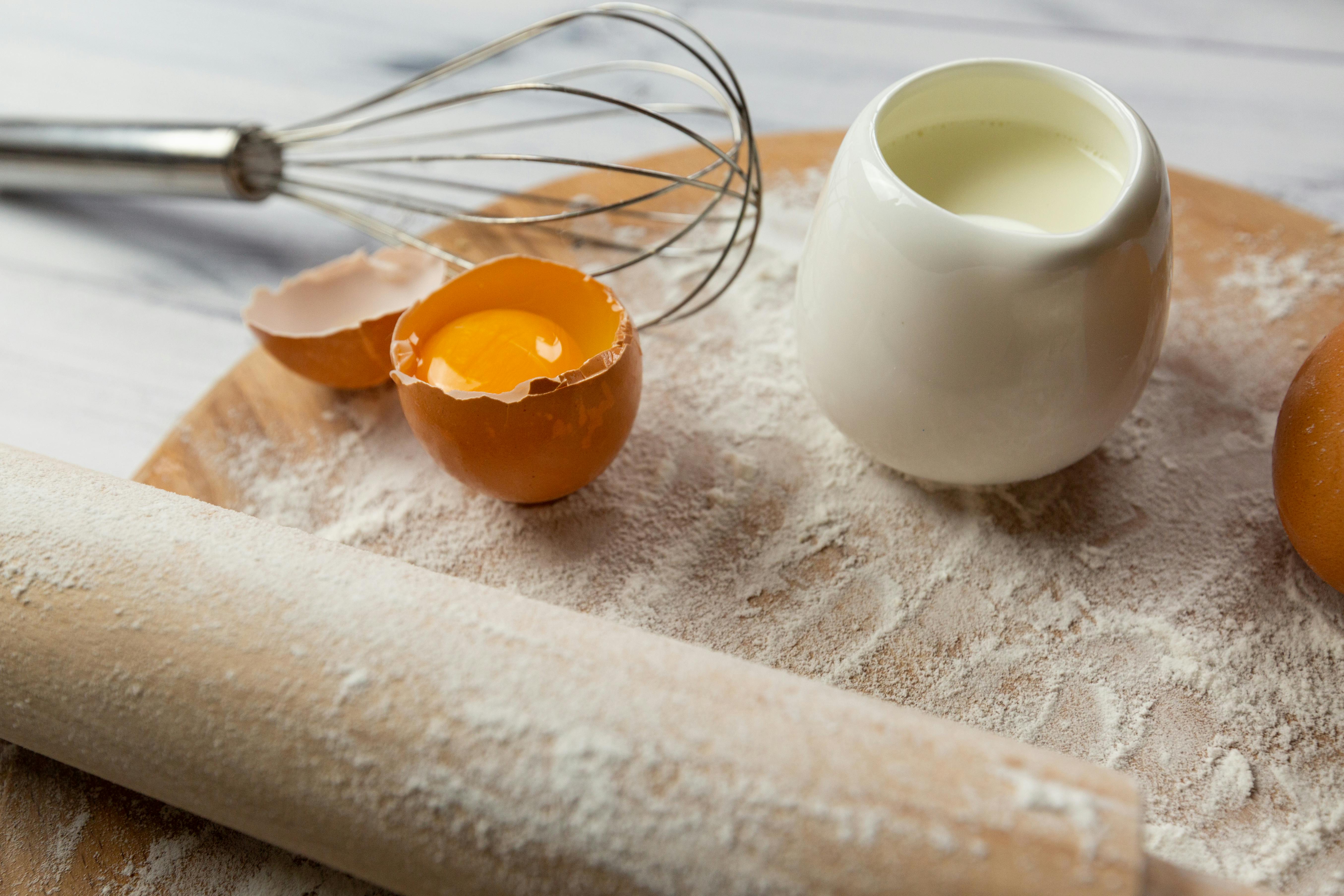 Person Whisking a Batter · Free Stock Photo
