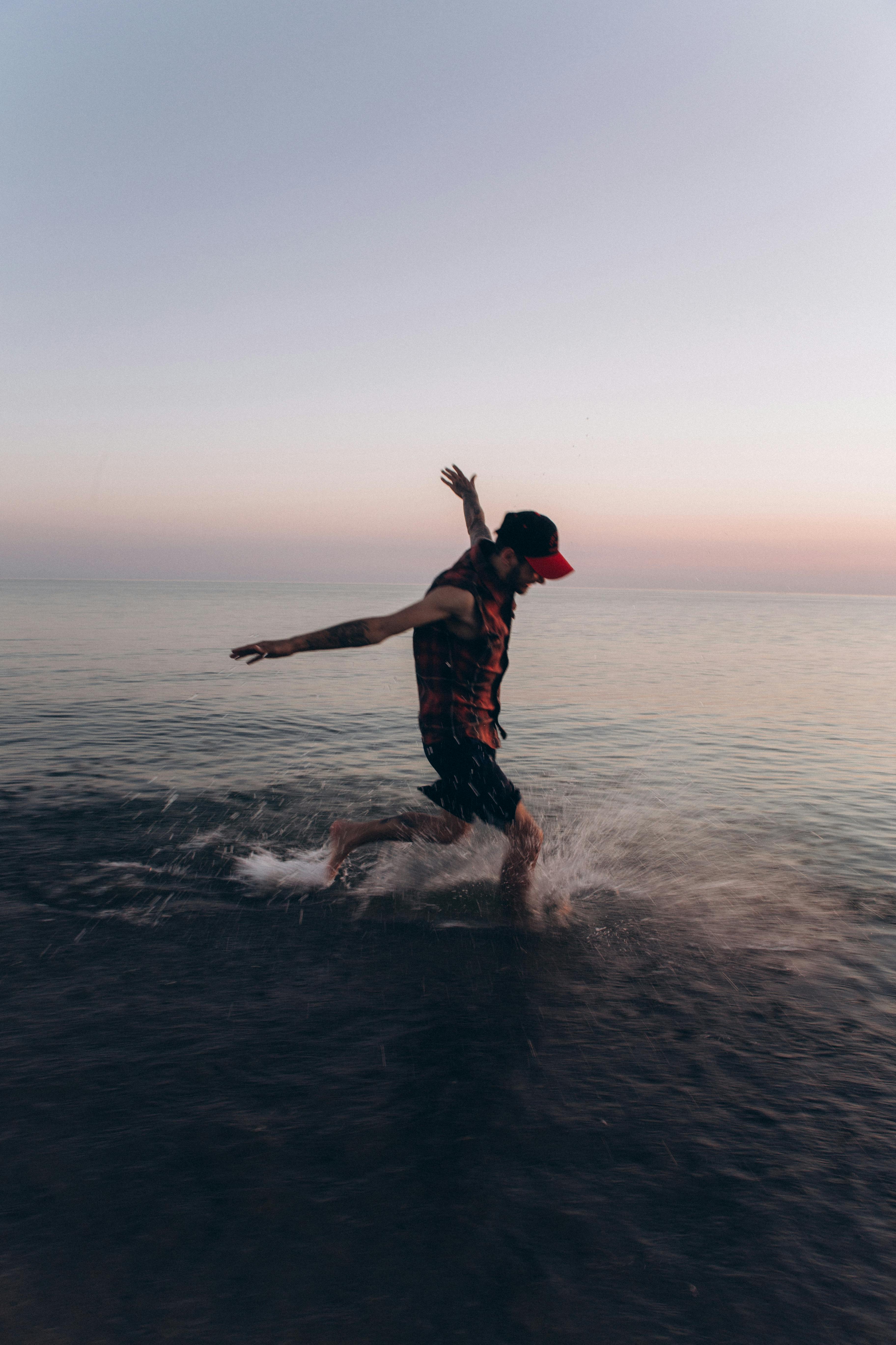 Time Lapse Photography of Man Jumping From Mountain Cliff · Free Stock ...