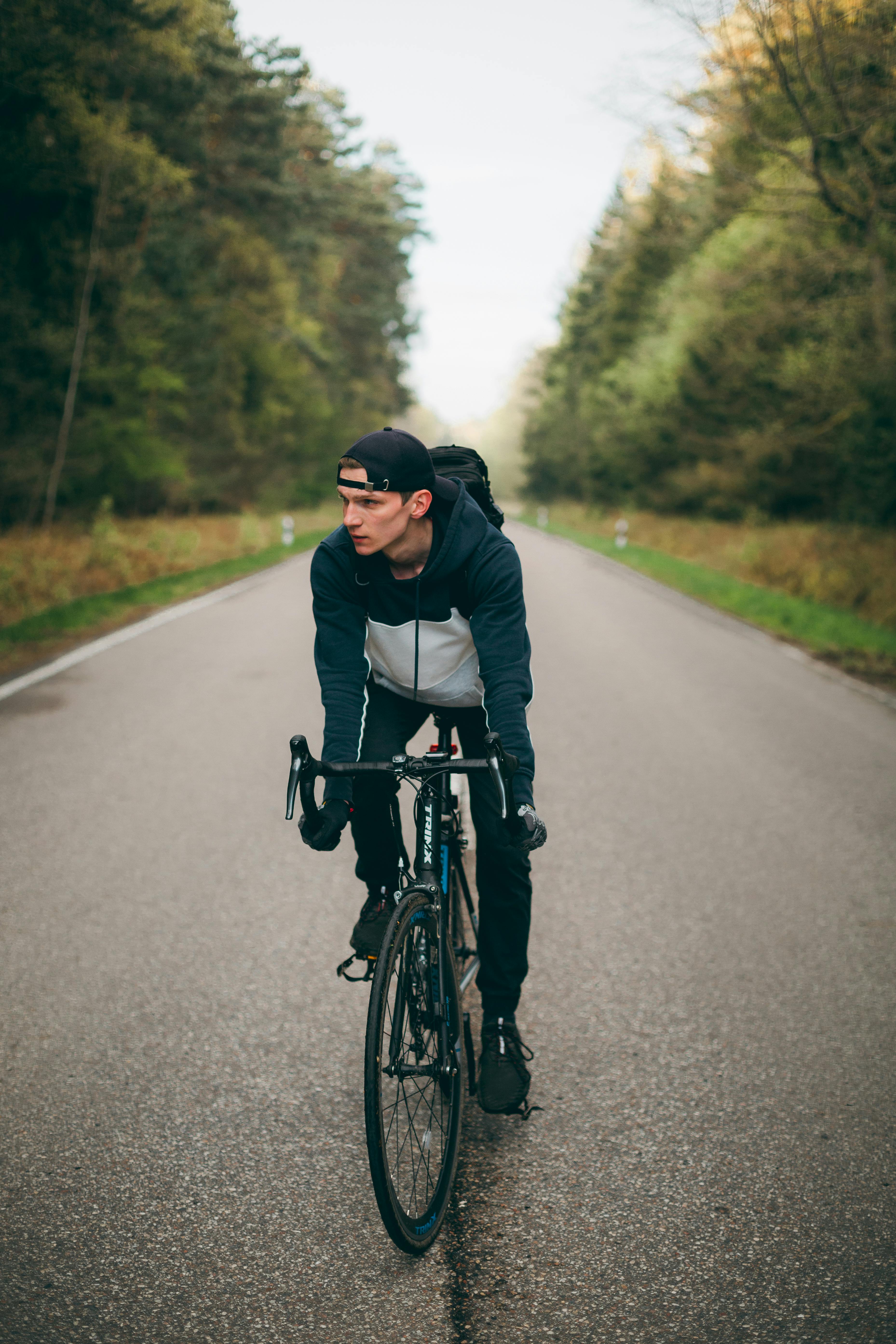 A Man Cycling · Free Stock Photo