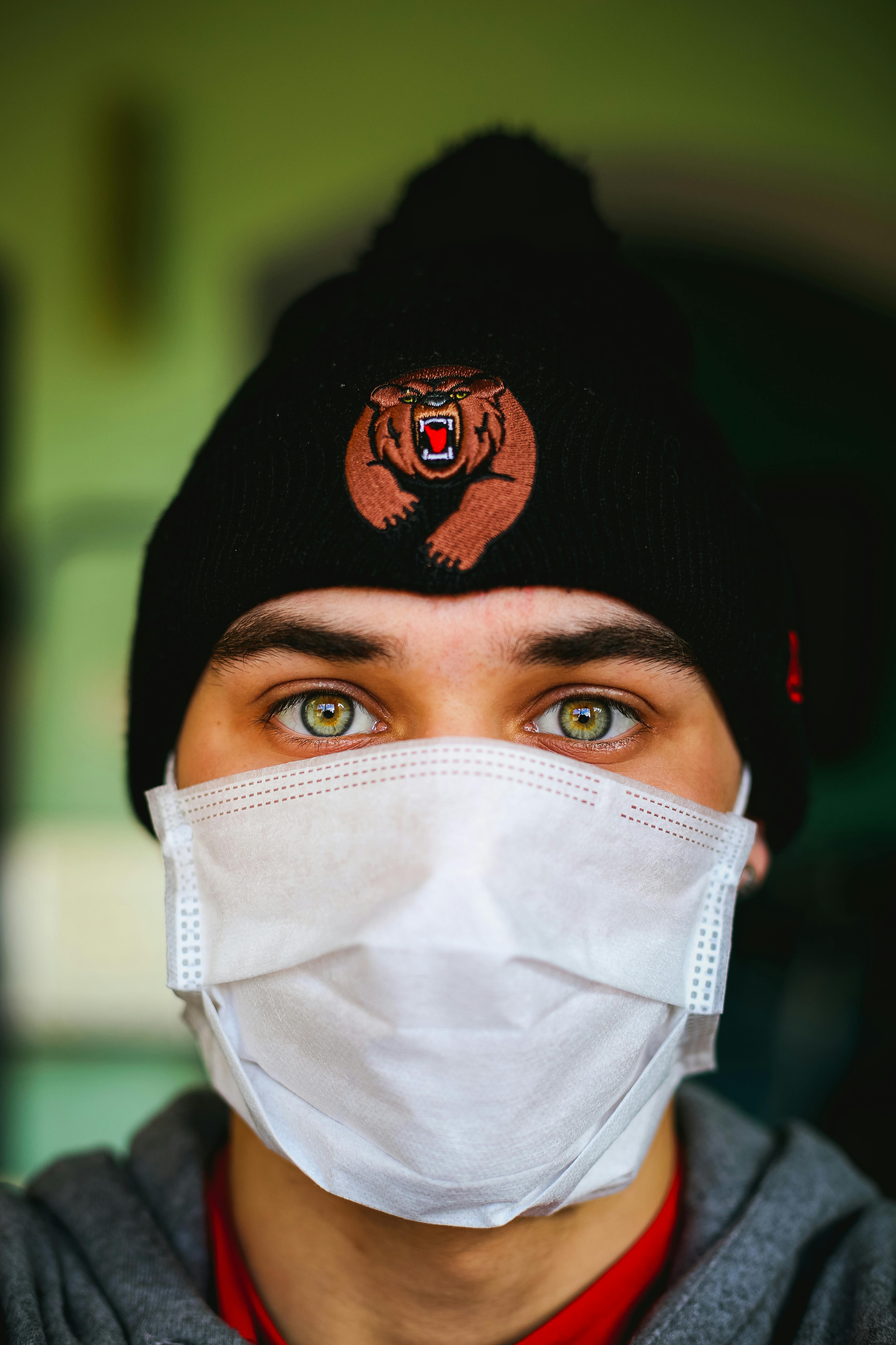 Person Wearing White Face Mask · Free Stock Photo