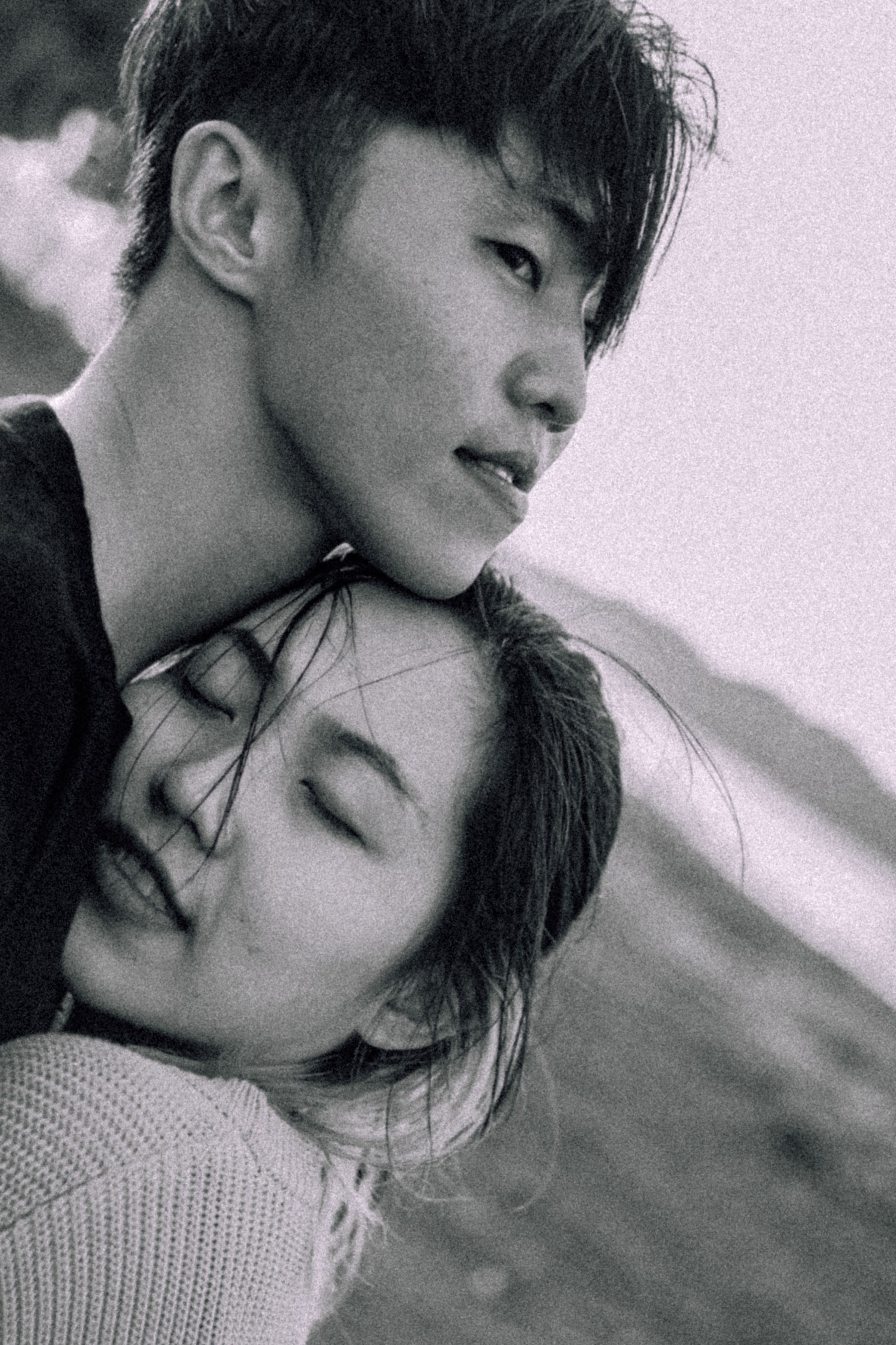 Grayscale Photo of a Romantic Couple Hugging · Free Stock Photo
