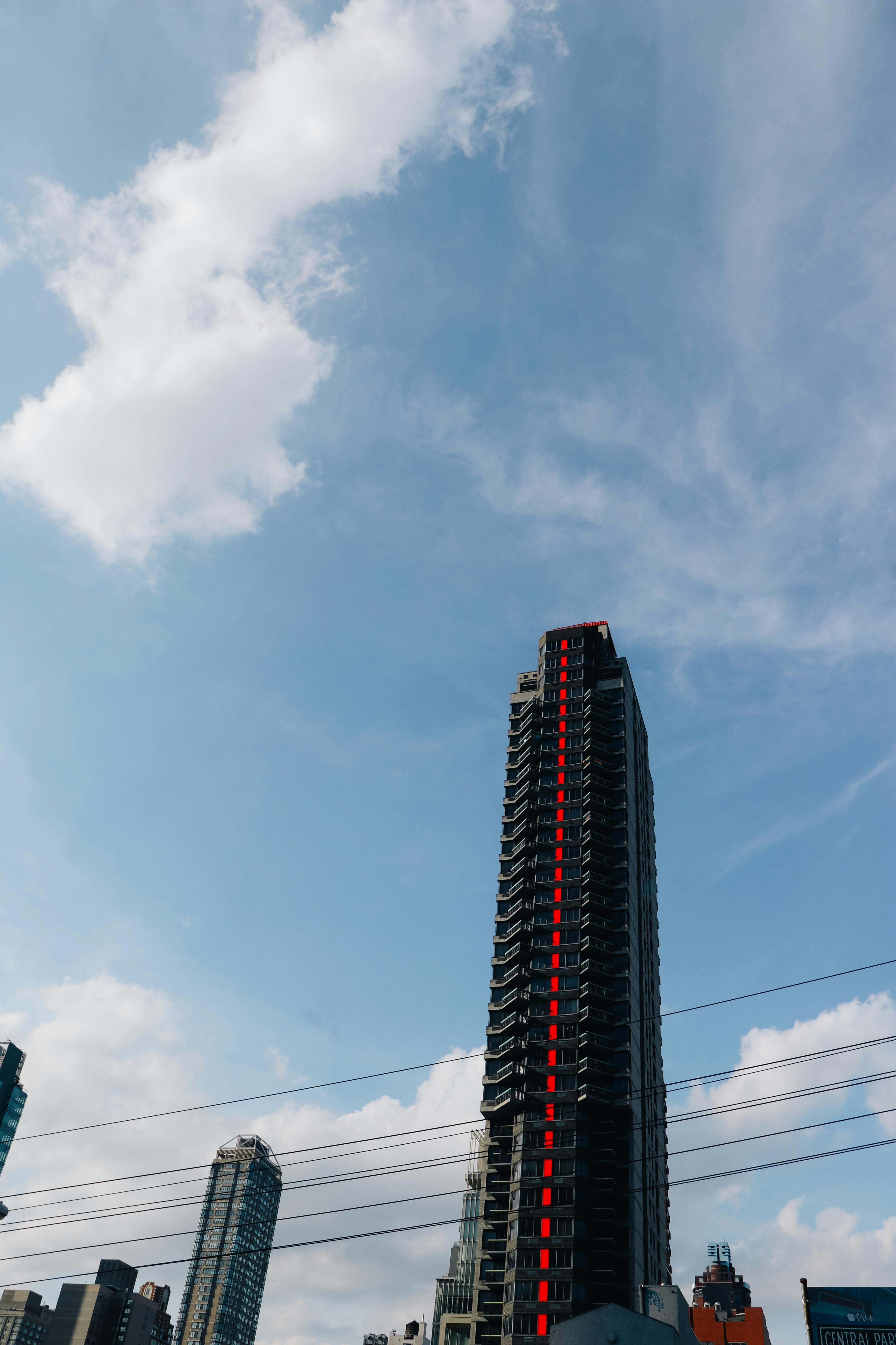 Building Under Cloudy Sky · Free Stock Photo