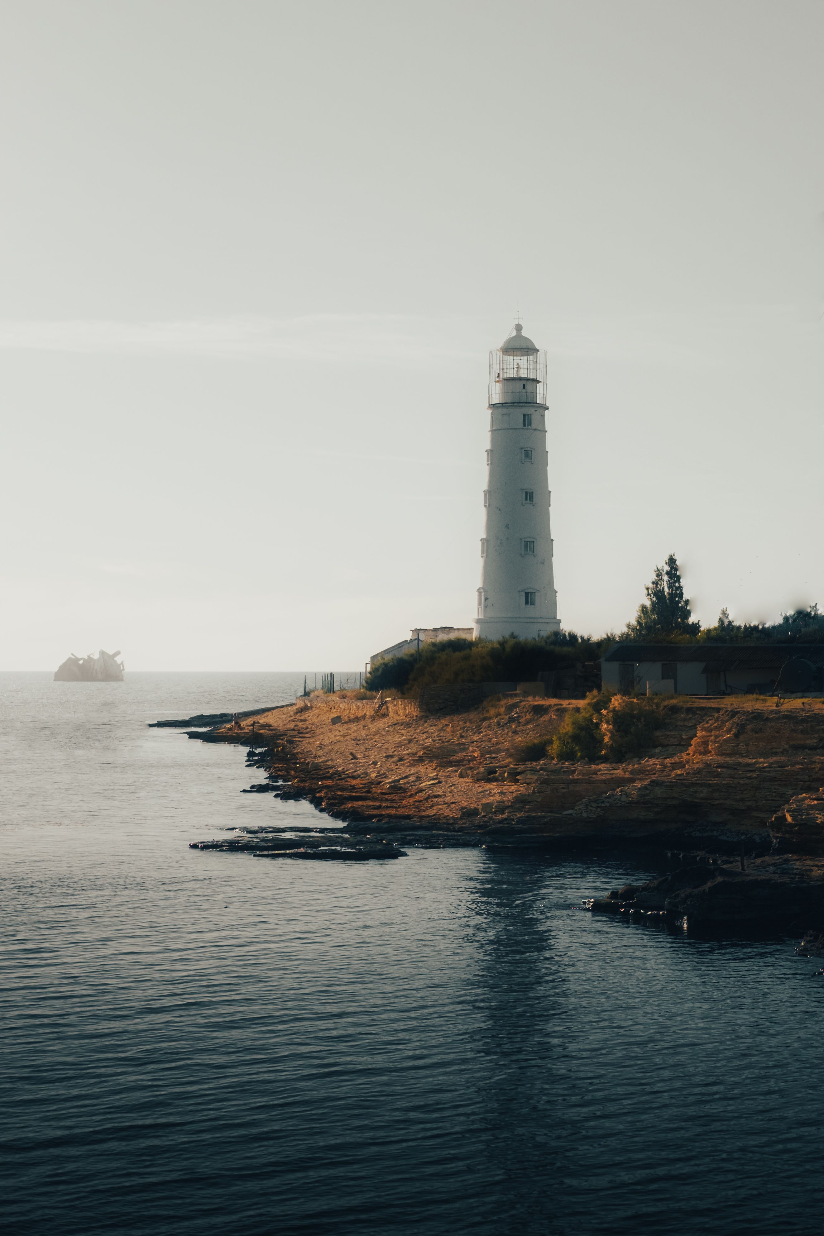 A Lighthouse by the Sea · Free Stock Photo