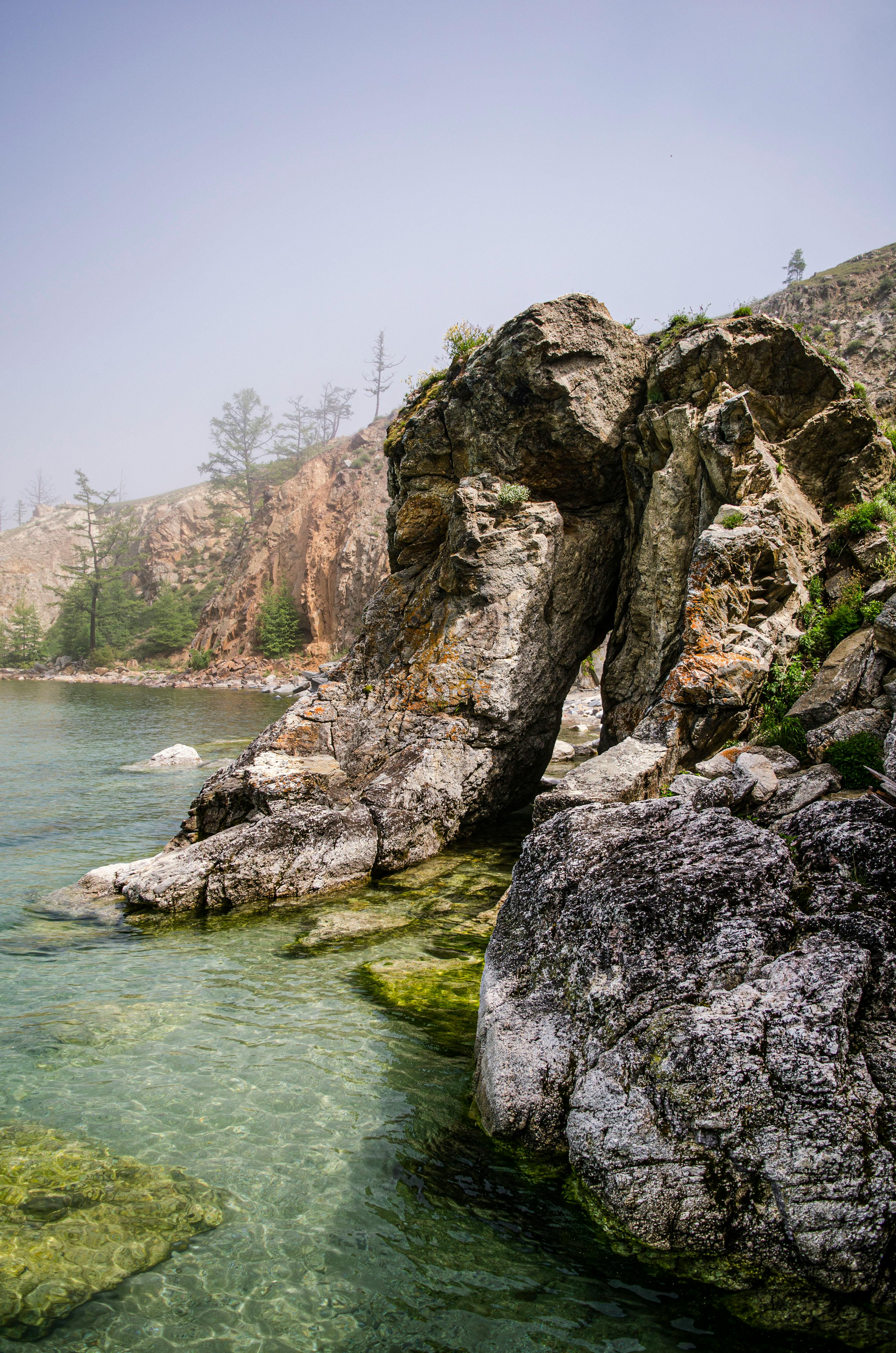 Rock Formations on a Coast · Free Stock Photo