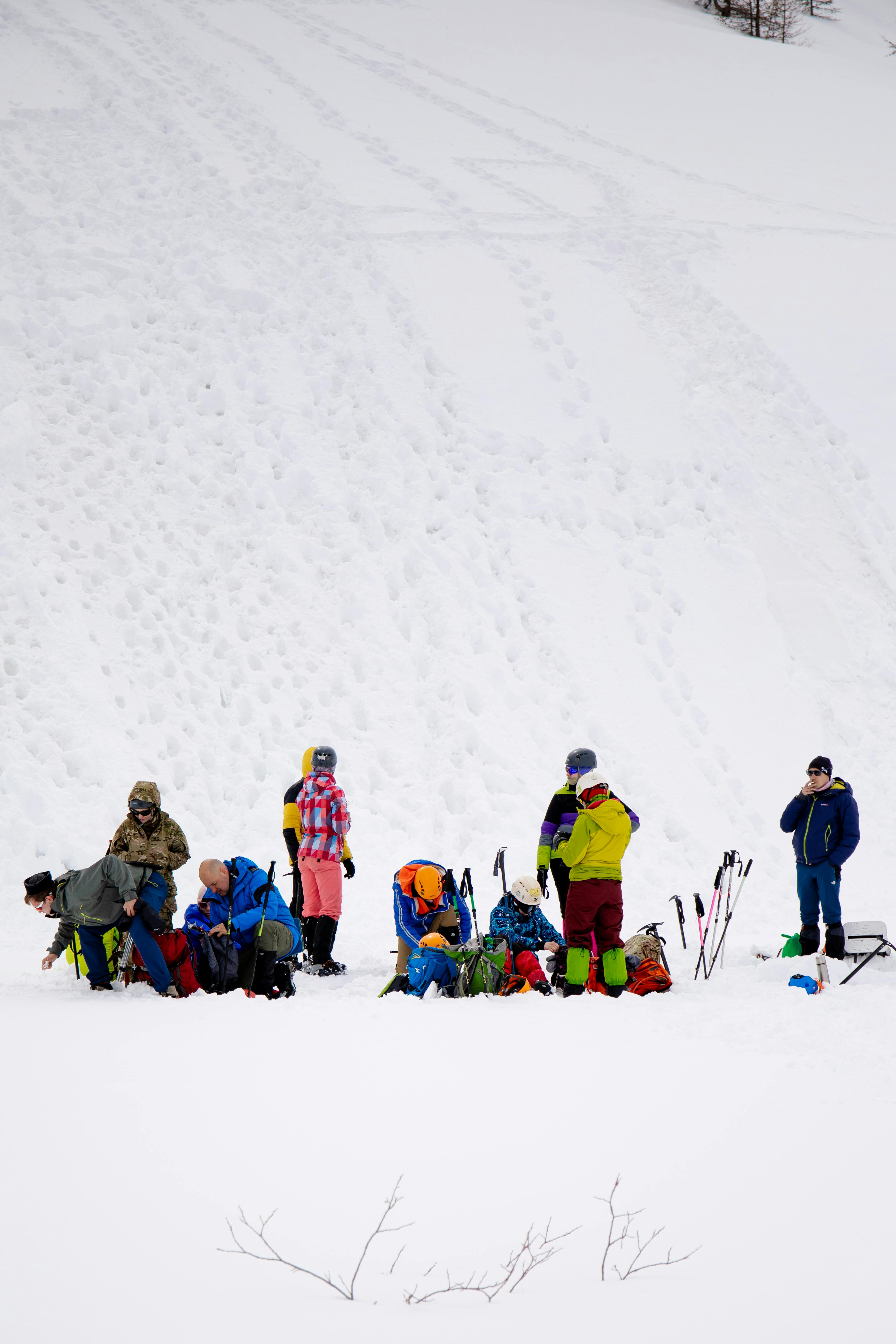 Group of People on Snow Covered Ground · Free Stock Photo