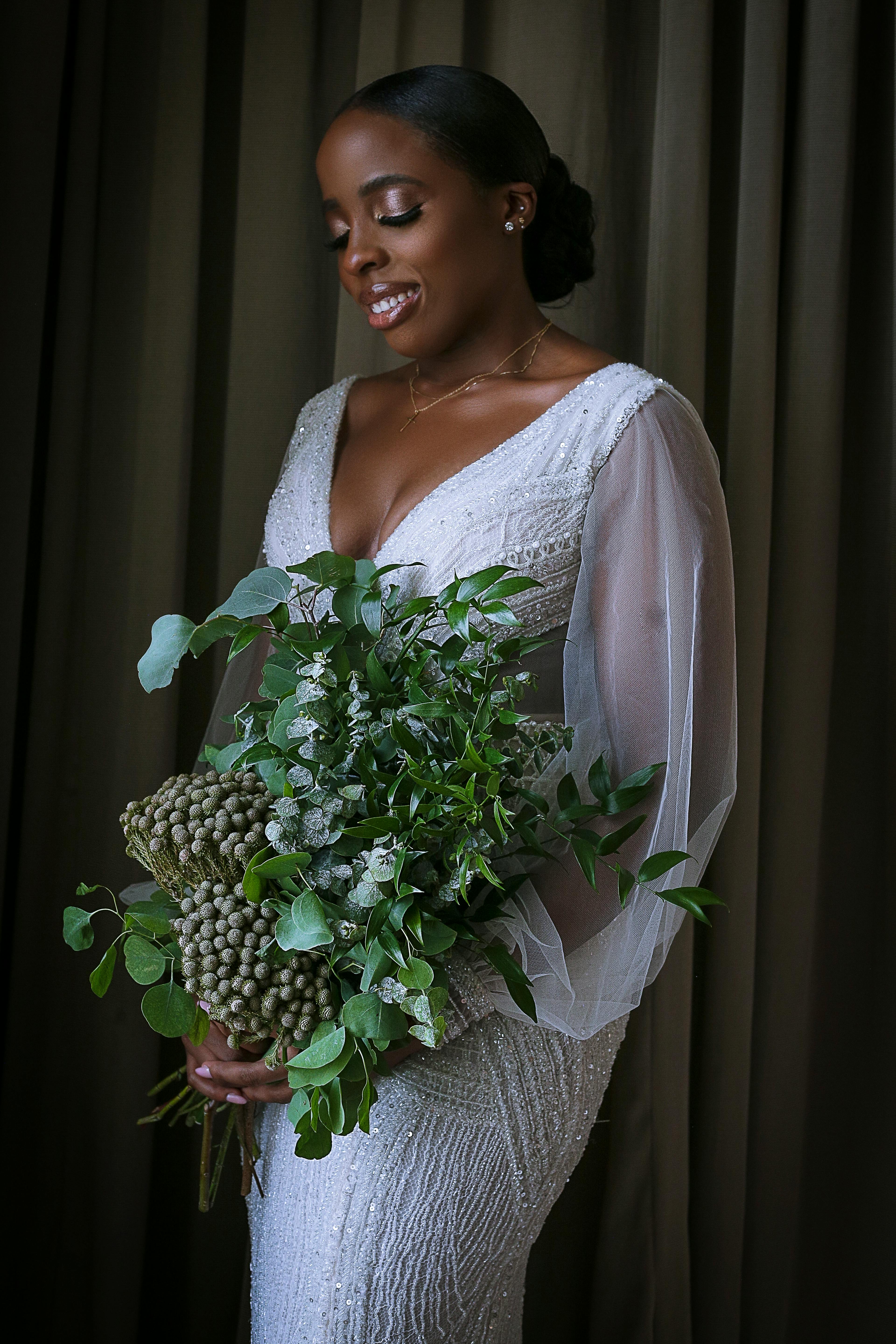 Photo of a Bride in a Dress Smiling · Free Stock Photo