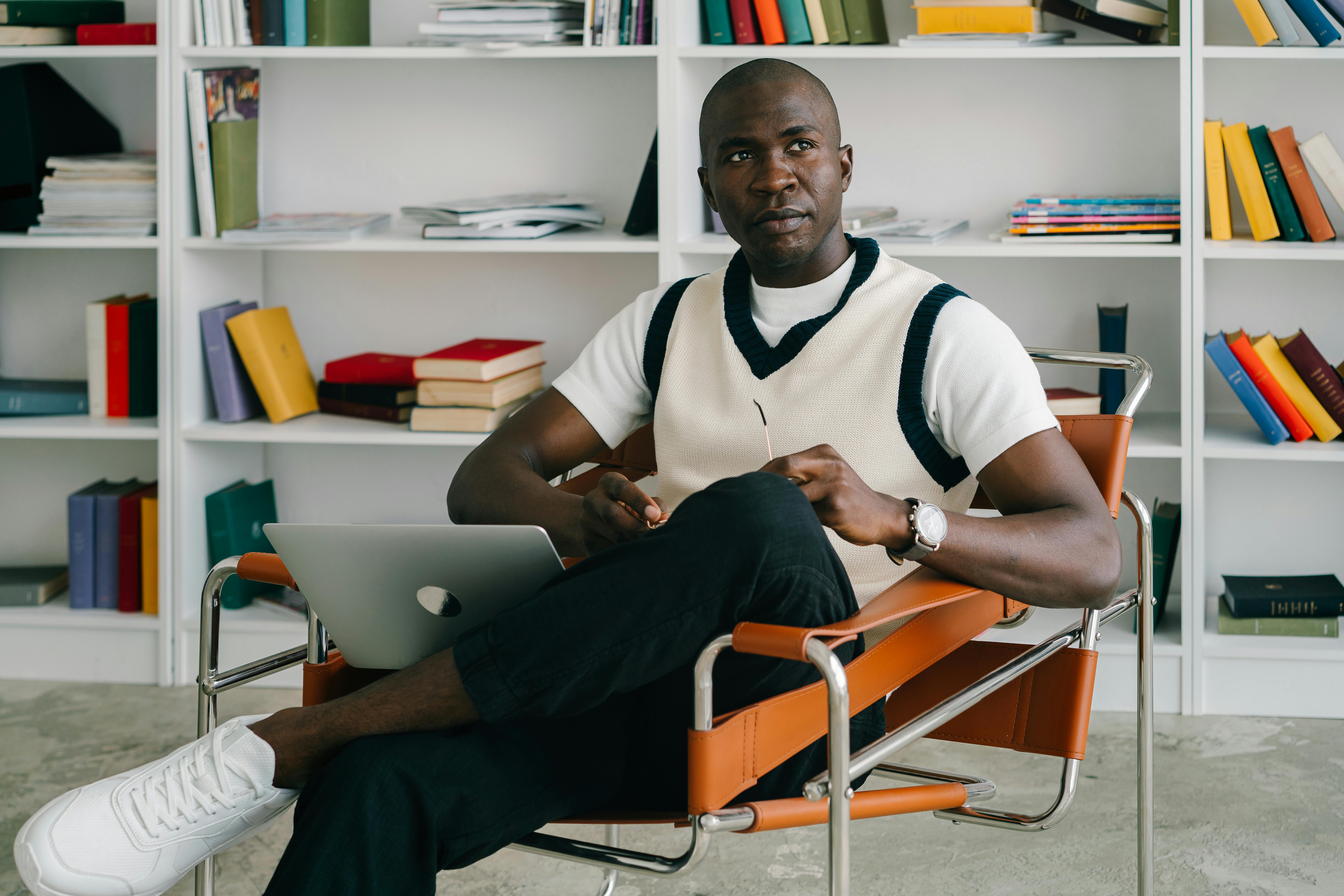 Man Looking Afar While Holding his Eyeglasses · Free Stock Photo