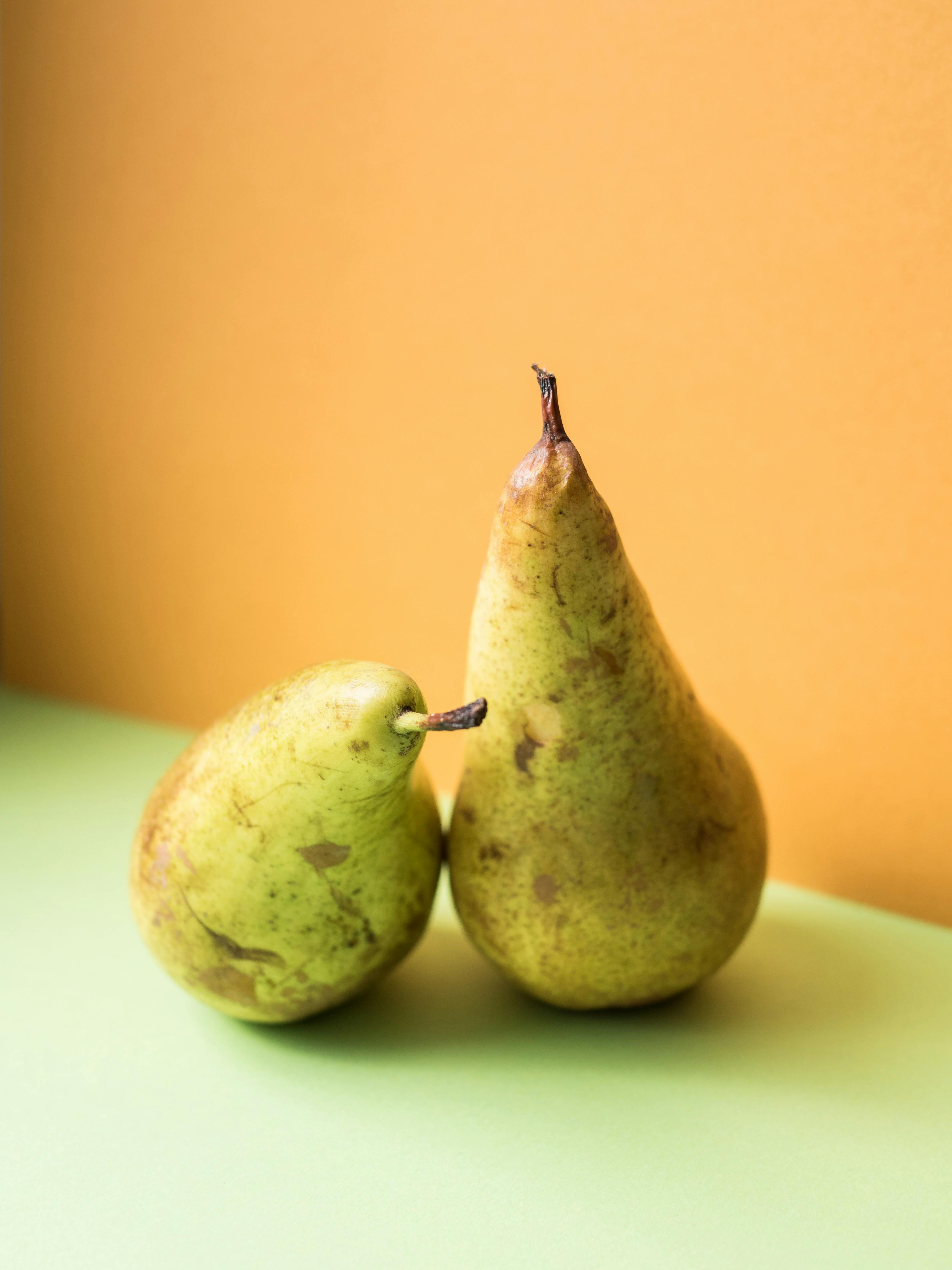 Photo of a Person Holding Pears · Free Stock Photo