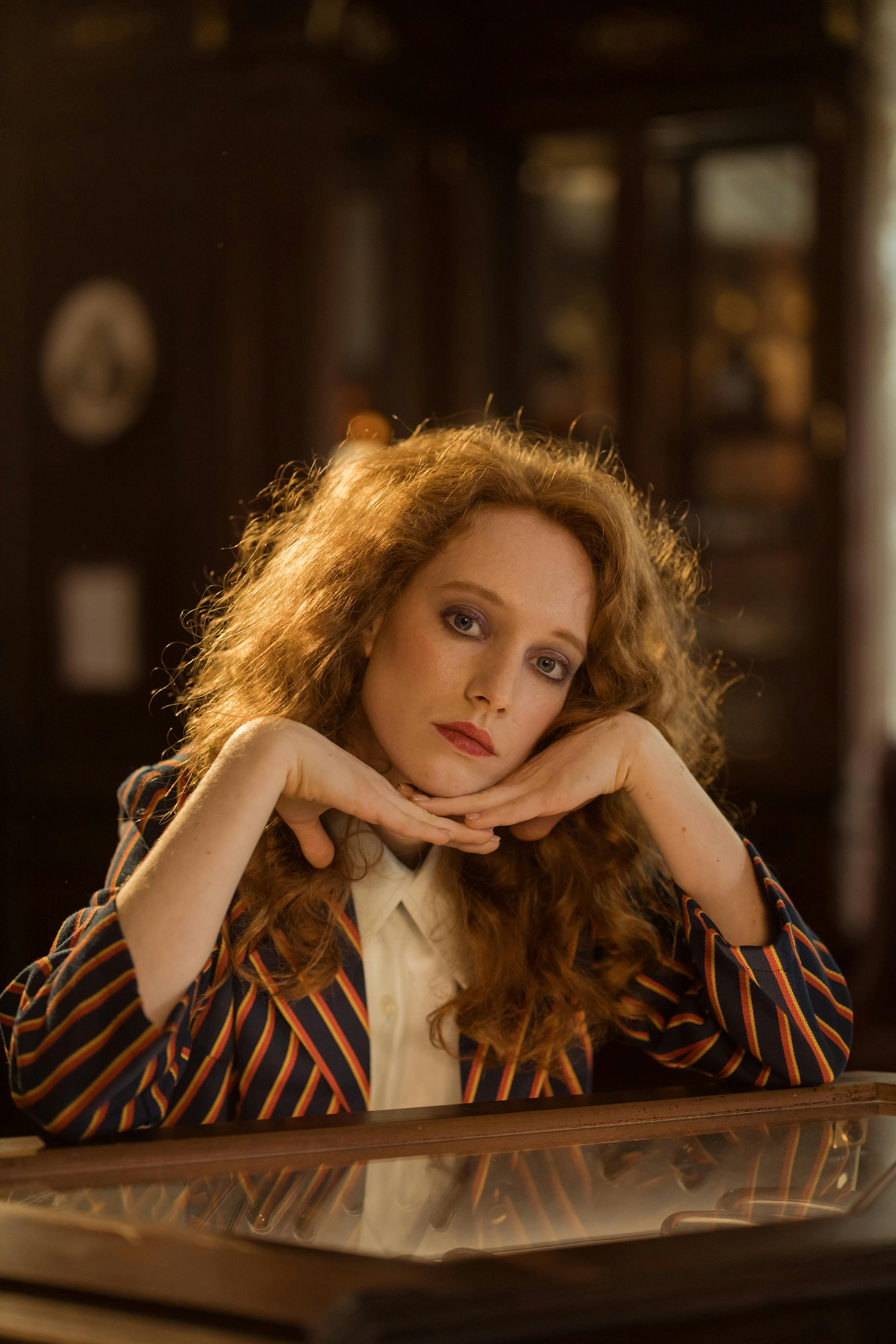 A Woman Leaning with Her Hands · Free Stock Photo
