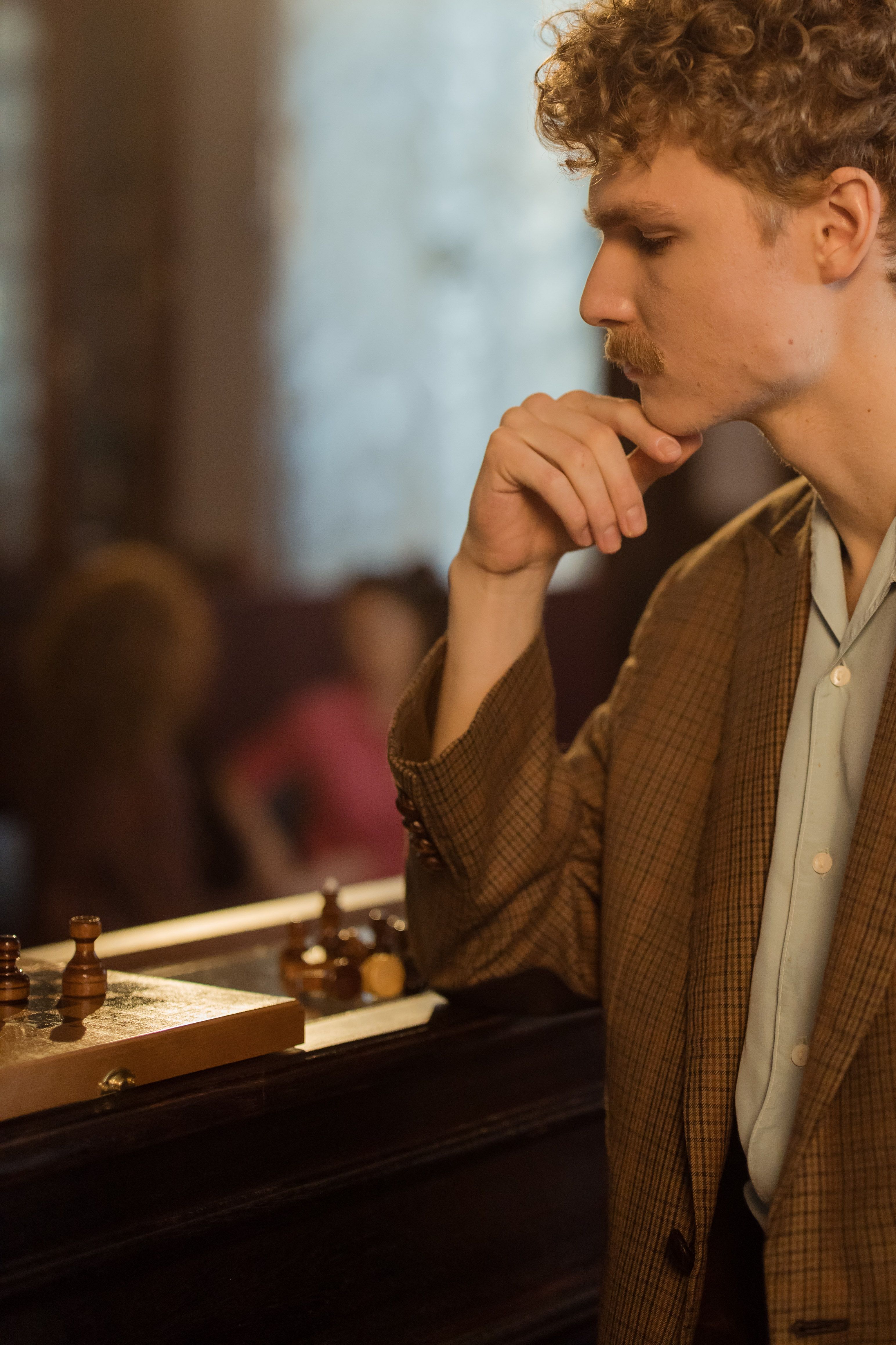 Man with Mustache Playing Chess · Free Stock Photo