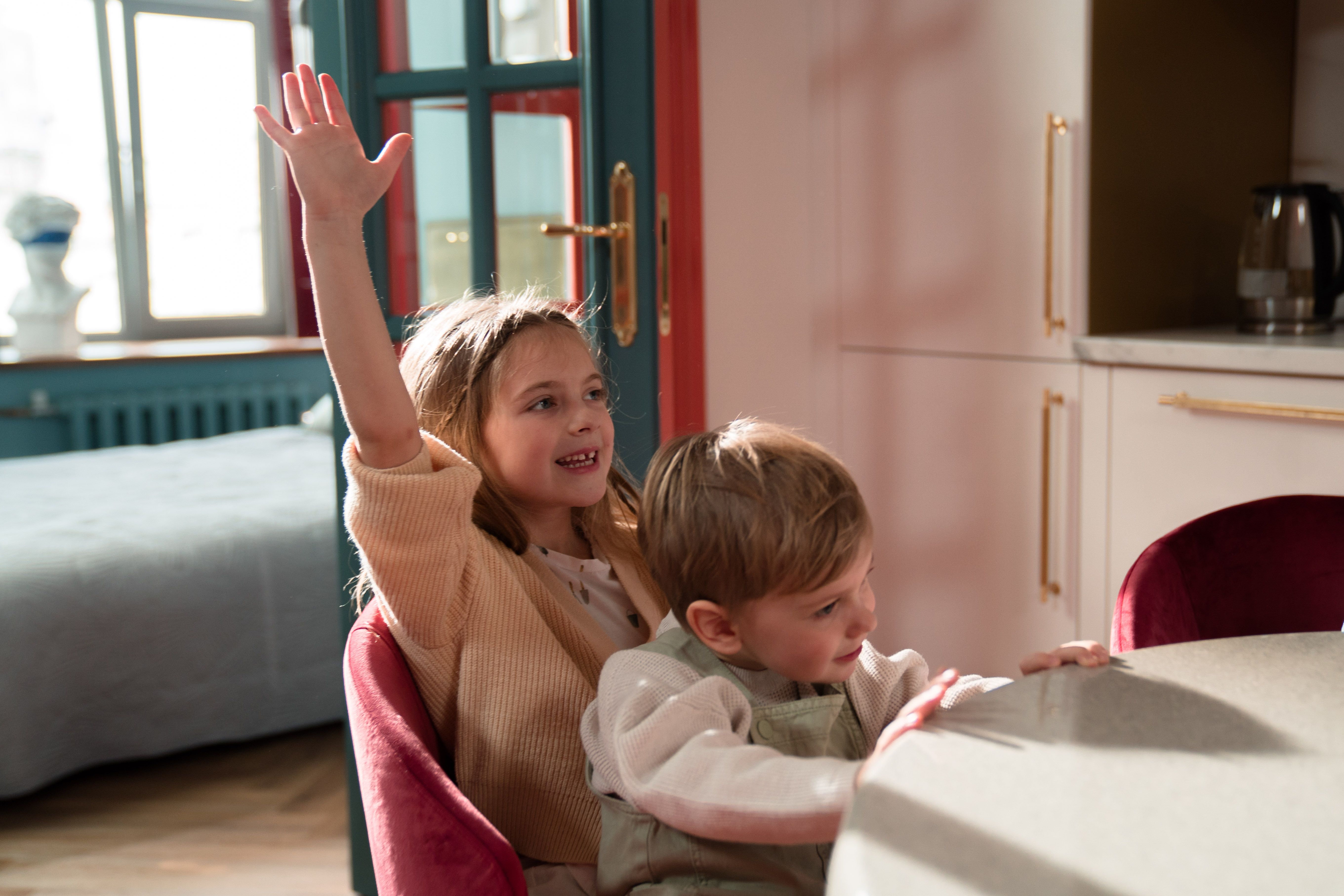 Two Kids Sitting on a Chair · Free Stock Photo